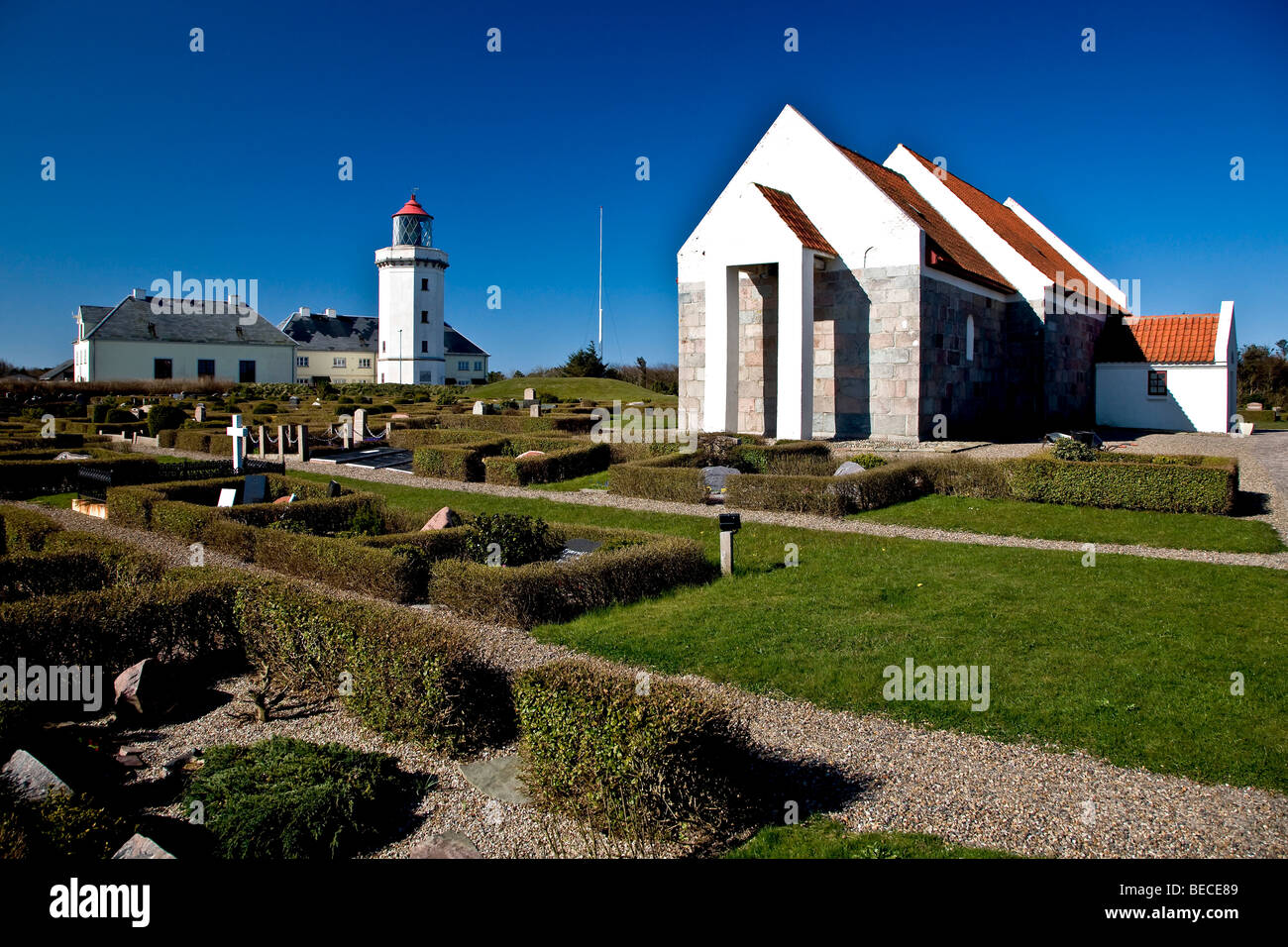 Church and lighthouse, Hansted, Denmark Stock Photo - Alamy