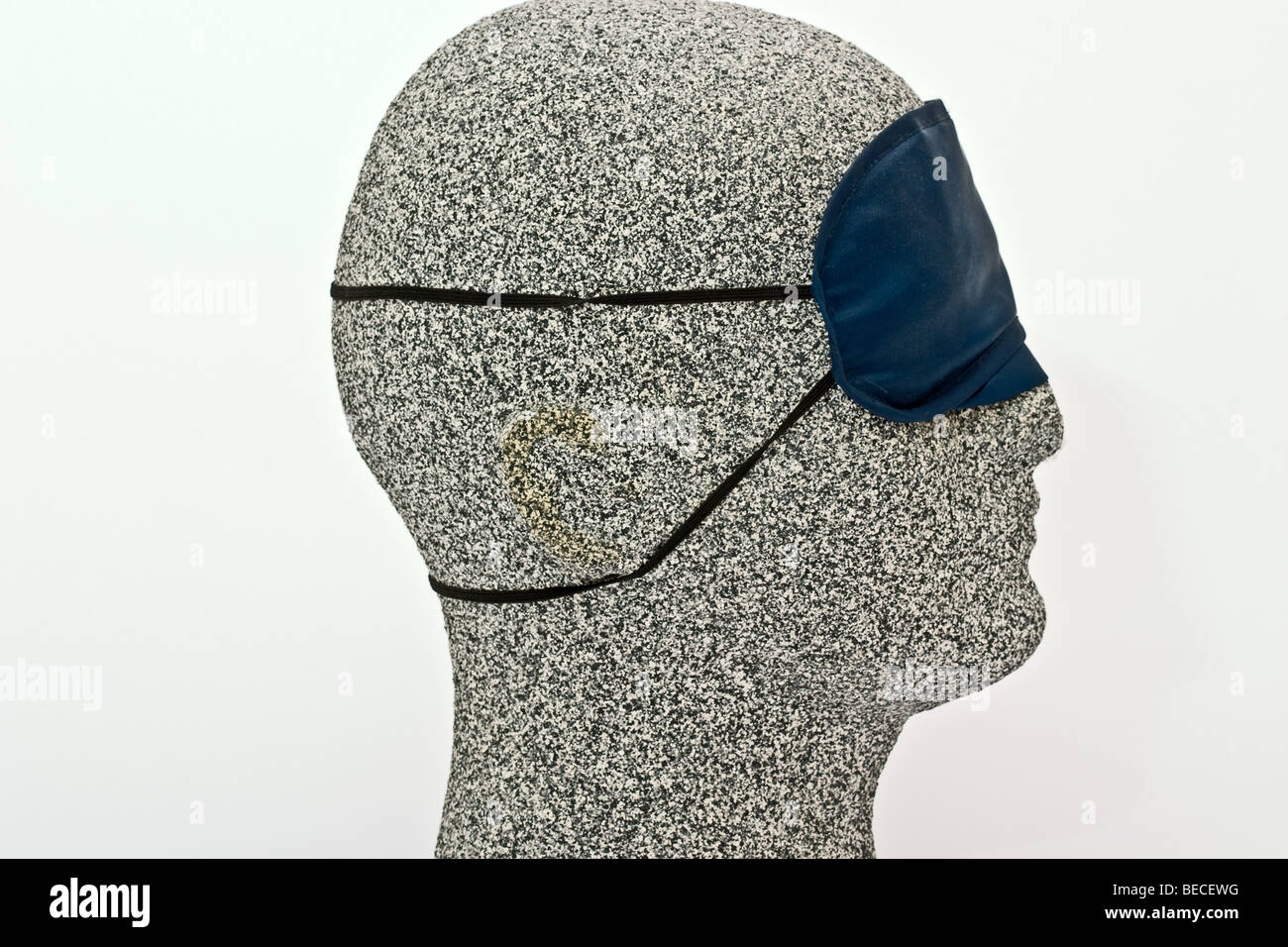 Styrofoam model head wearing a cloth sleep mask Stock Photo - Alamy