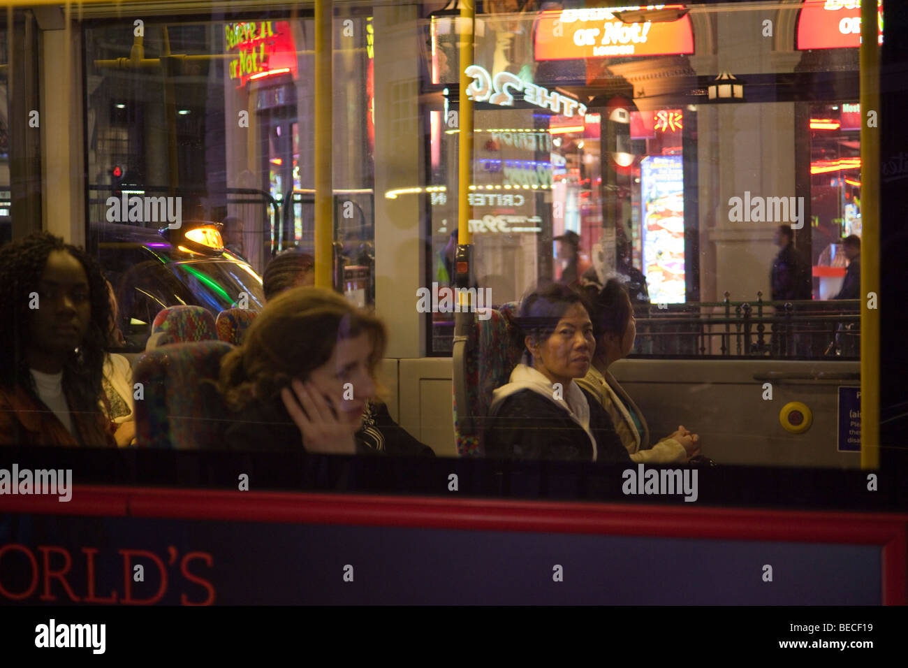 passenger on night bus, Piccadilly Circus, London, England, UK Stock ...