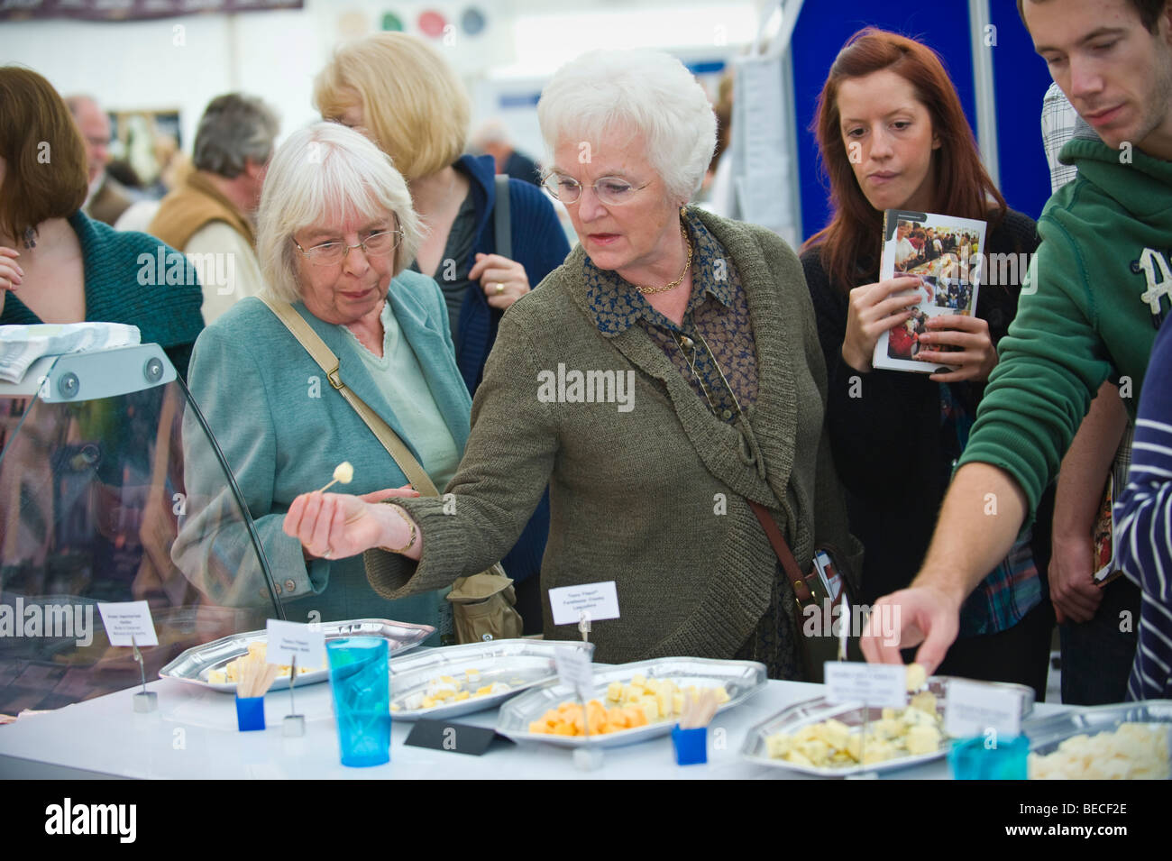 Visitors sampling cheese at The Great British Cheese Festival Cardiff ...