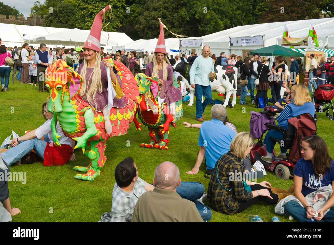 Public performance artists dressed as dragons entertain visitors at The ...