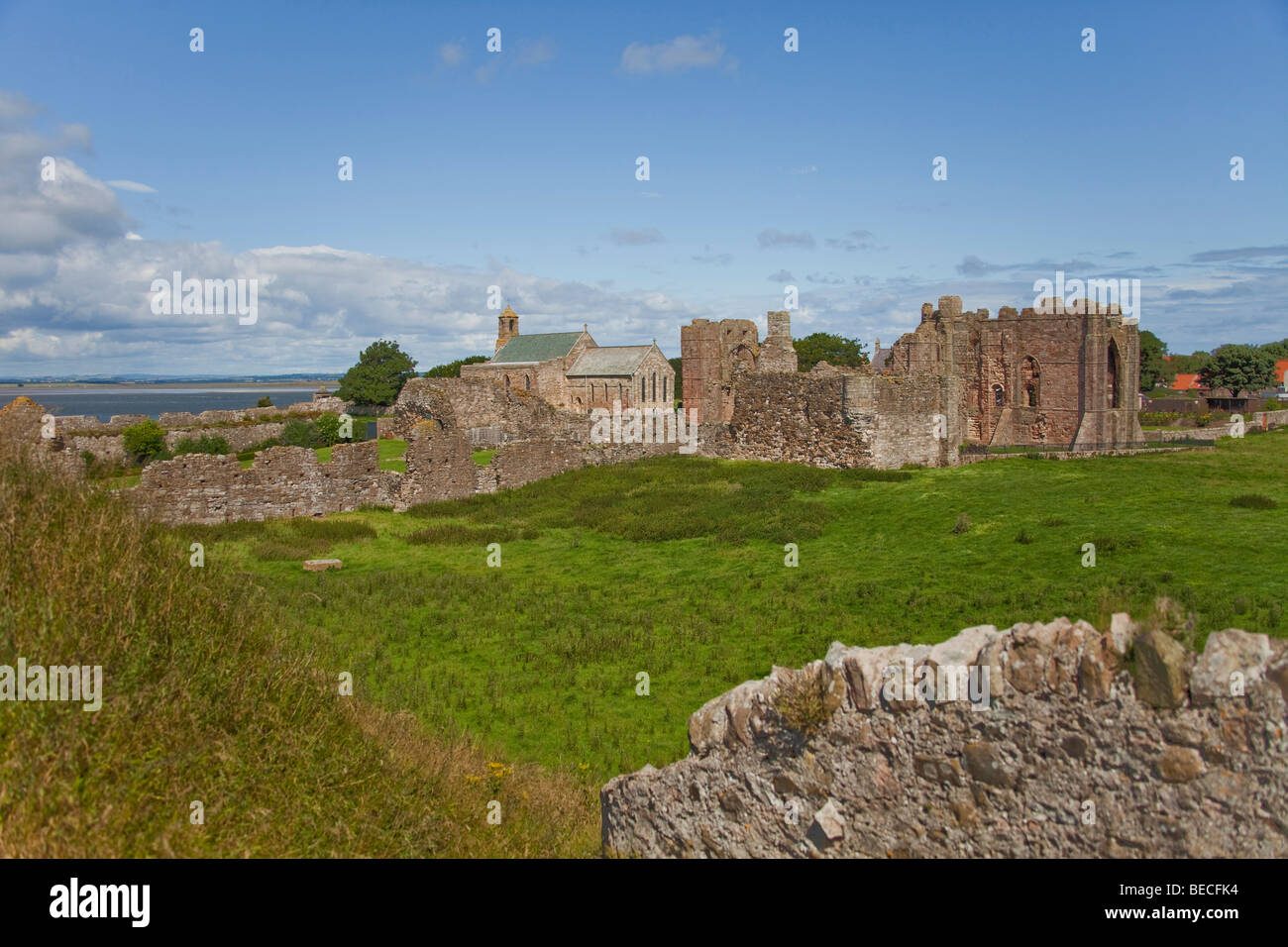 Priory monastery, Lindisfarne Holy Island UK Northumberland. blue sky ...
