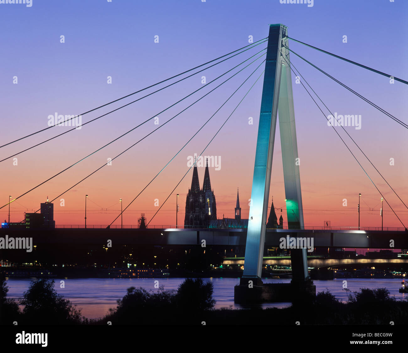 Panorama of Cologne with Severins Bridge and Cologne Cathedral, dusk ...
