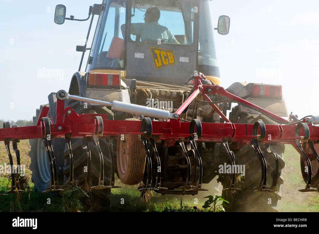 JCB Fastrac 1135 4-wheel drive tractor and soil harrow - France Stock ...