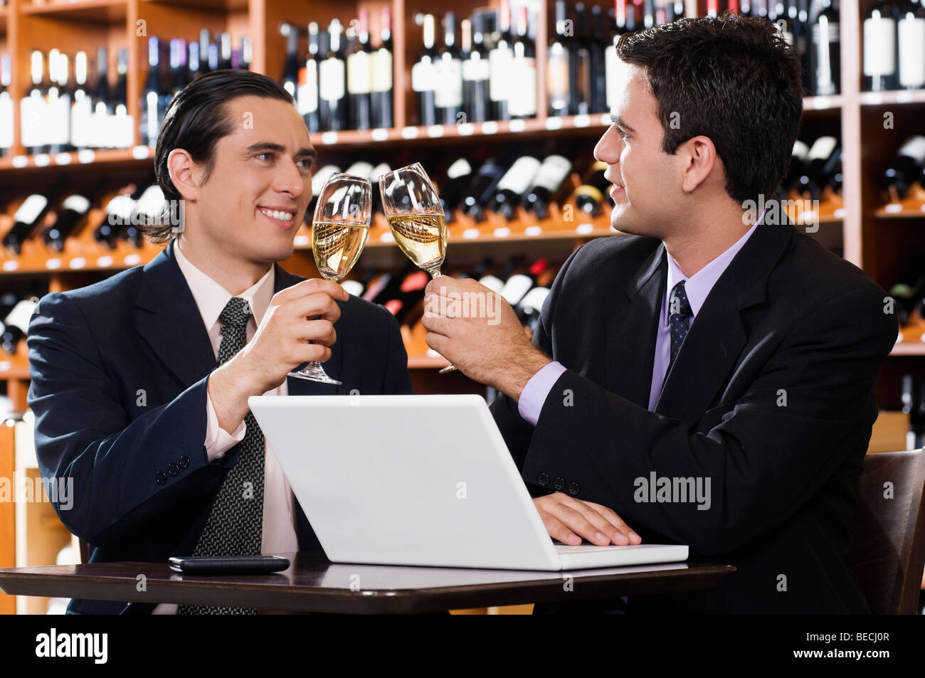Two businessmen sitting in a bar hi-res stock photography and images ...