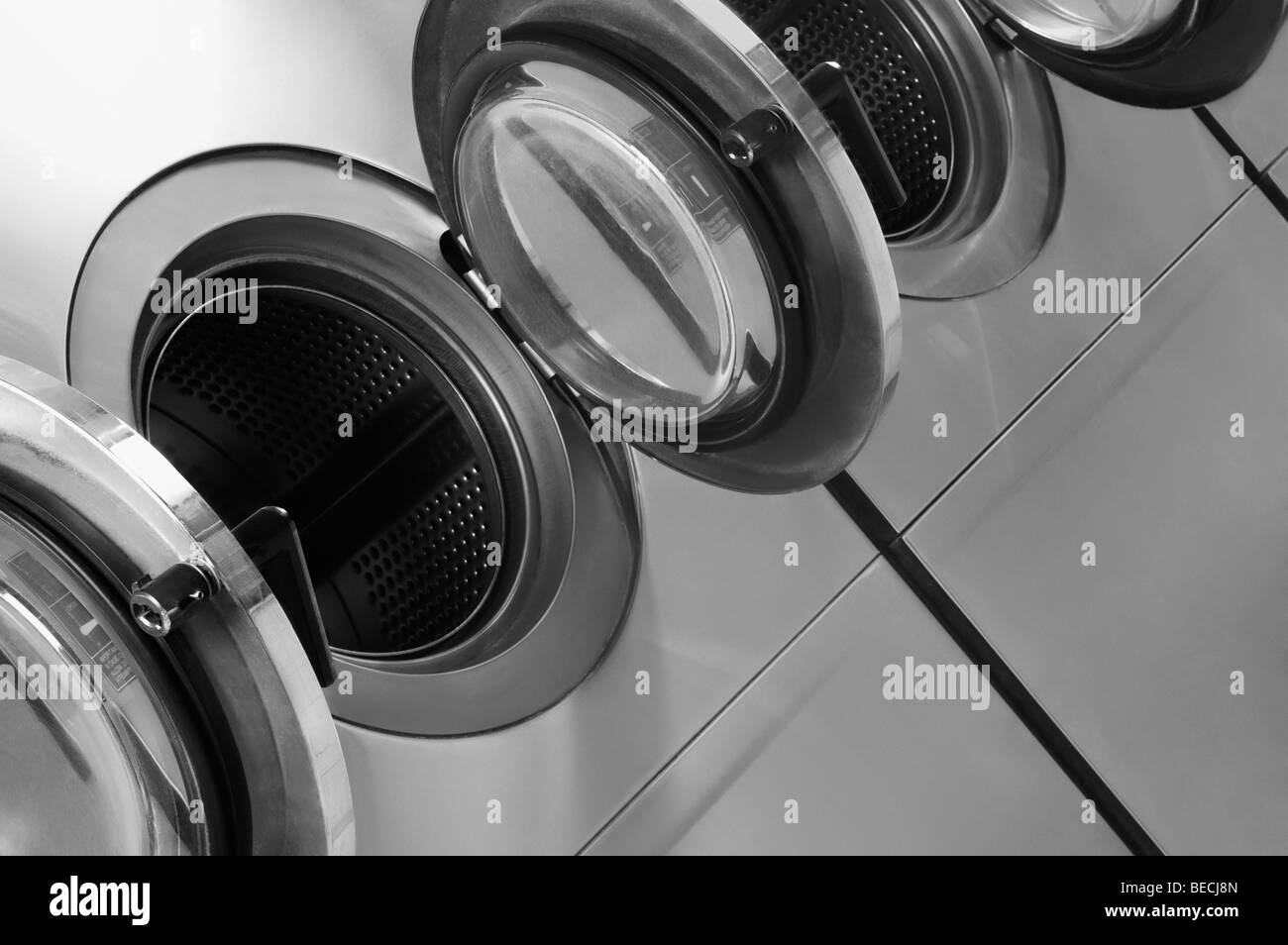 Photography of a washing machine in a launderette hi-res stock ...