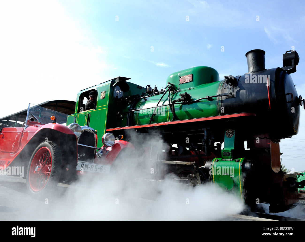 Steam Locomotive coal tank engine railway station with Aero veteran car ...