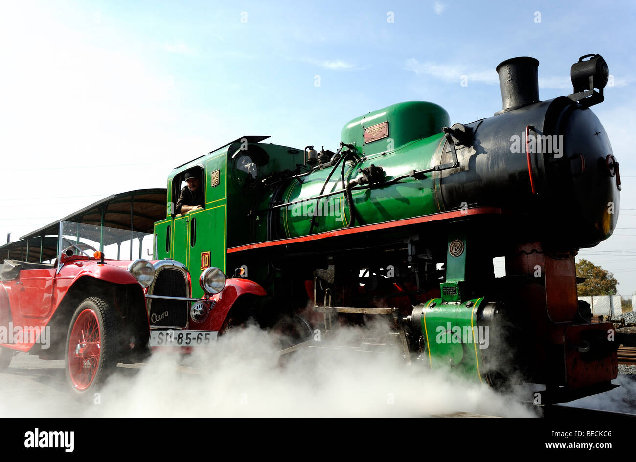 Steam Locomotive coal tank engine railway station with Aero veteran car ...