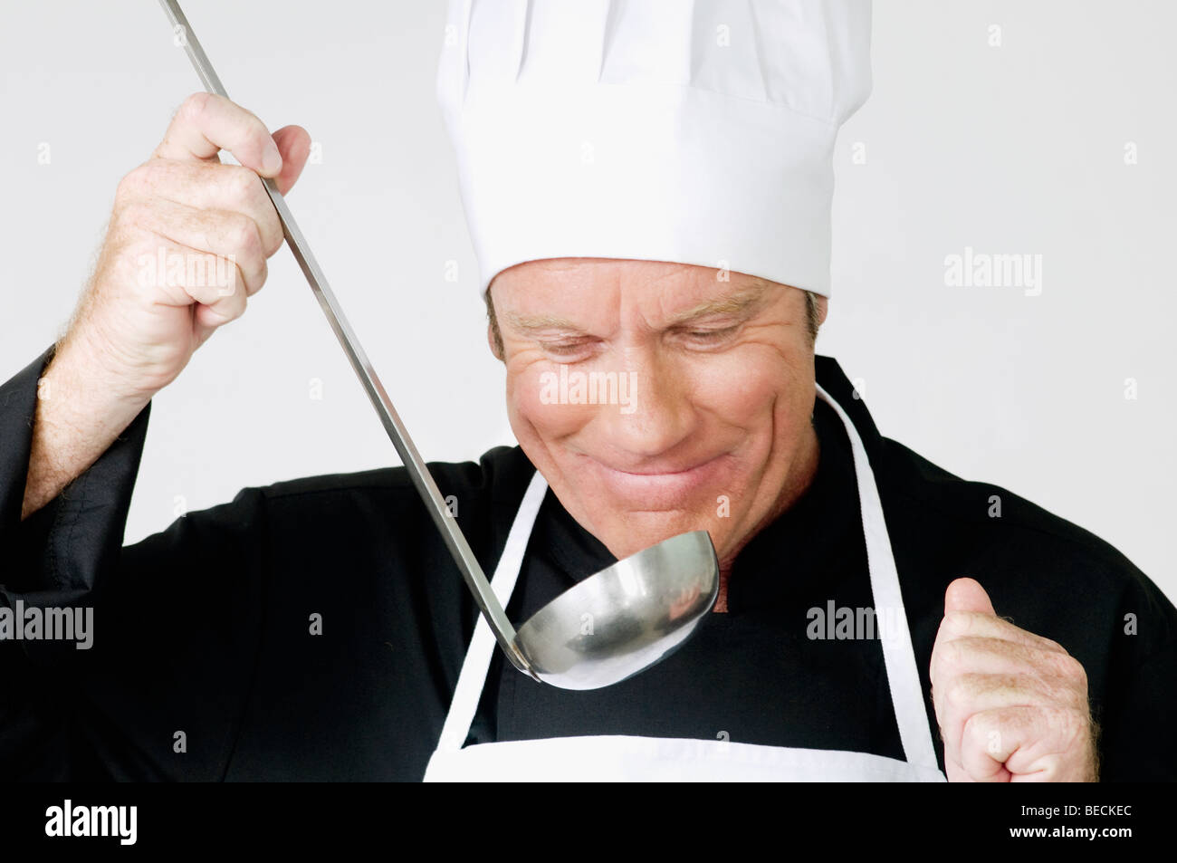 Chef smelling the cooked food Stock Photo - Alamy