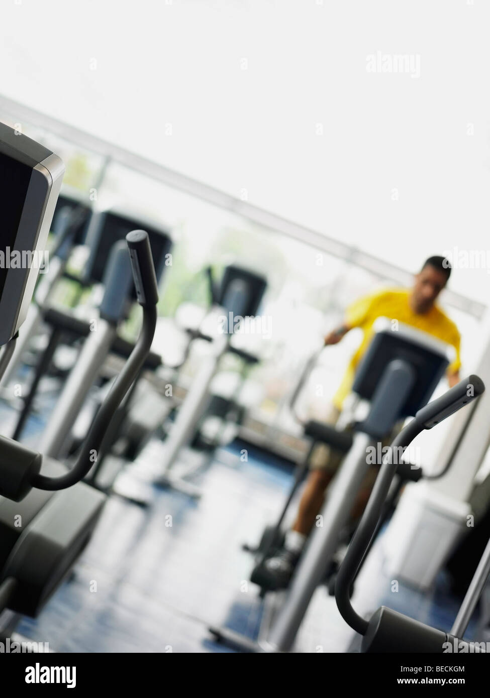 Man exercising in a gym Stock Photo - Alamy