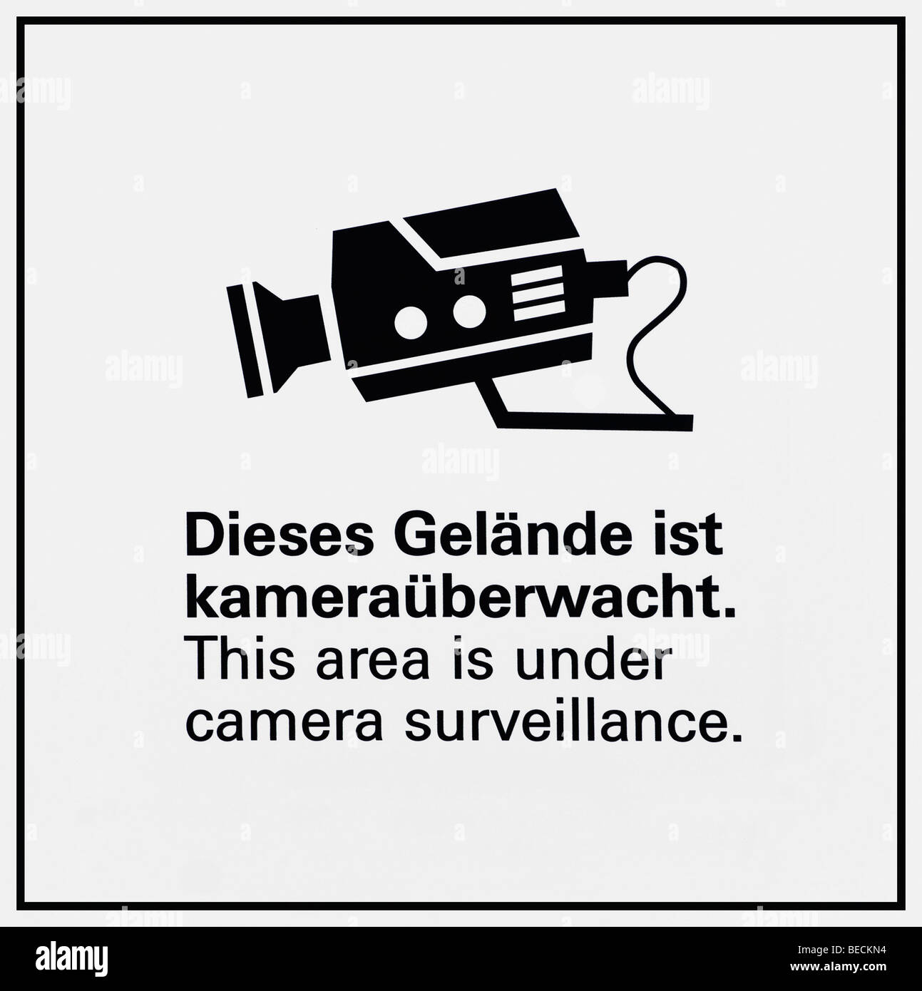 Sign, this area is under camera surveillance, bilingual with a ...