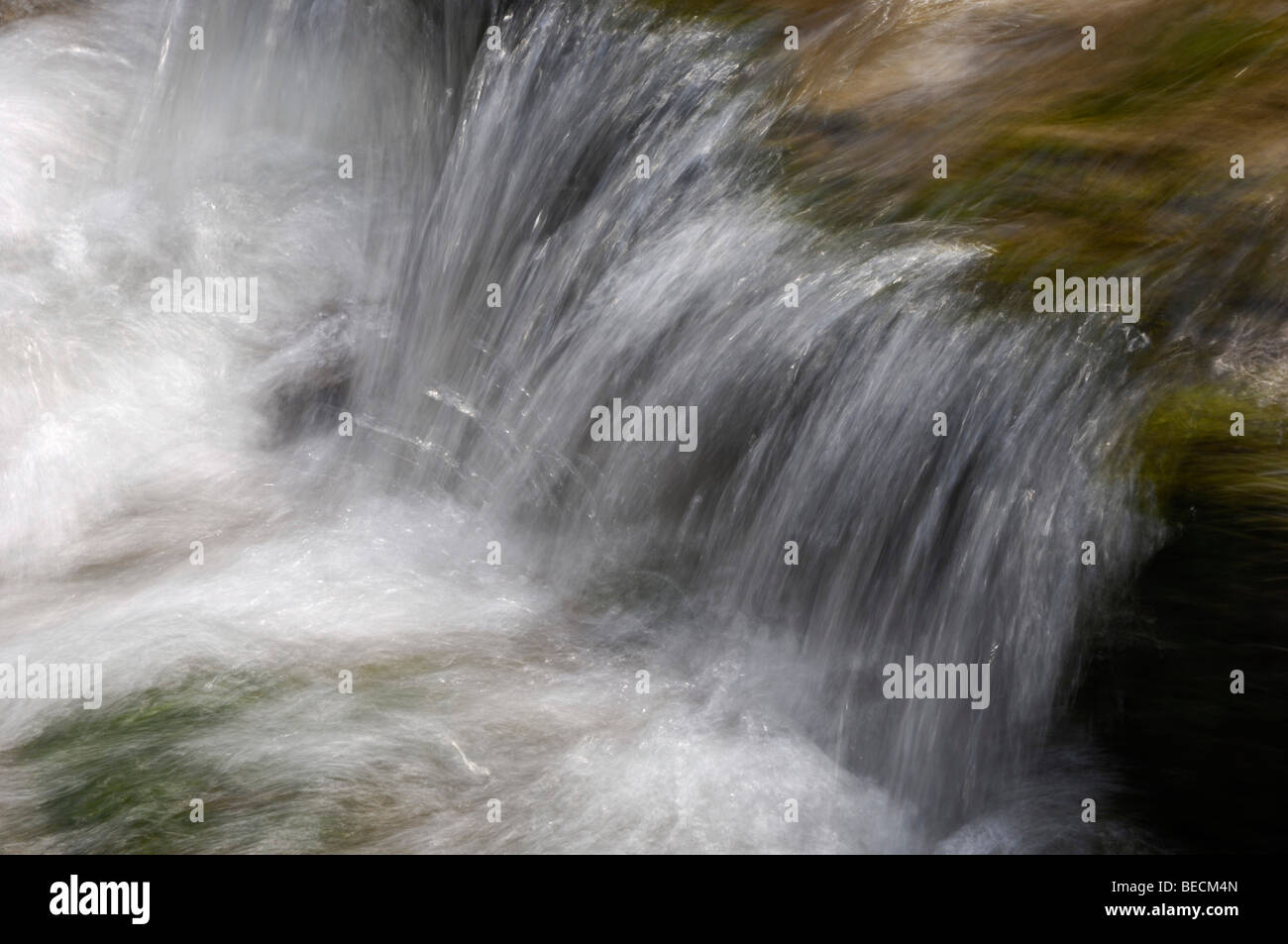 Small waterfall, running water, close-up Stock Photo - Alamy