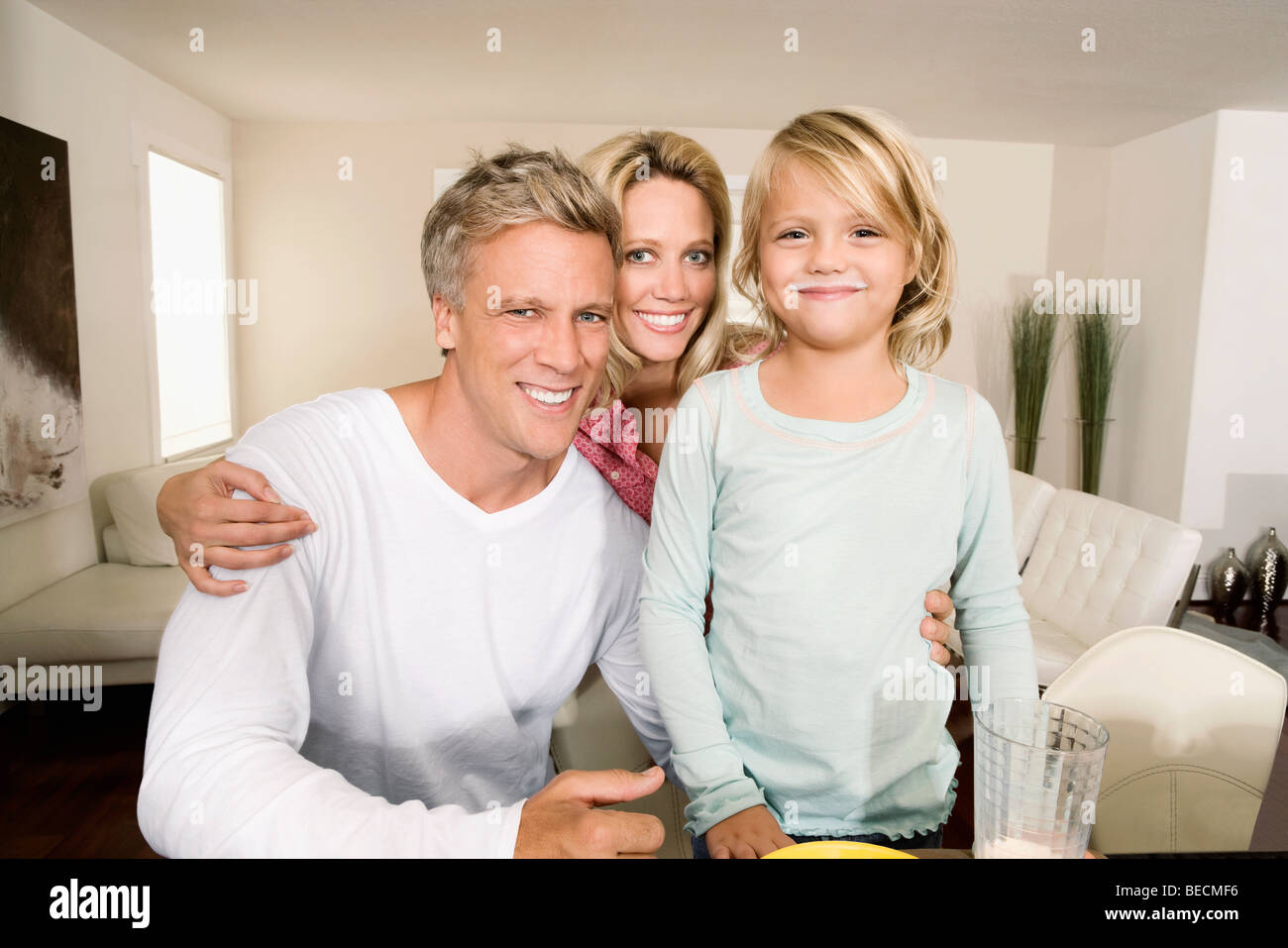Portrait of a family smiling Stock Photo - Alamy