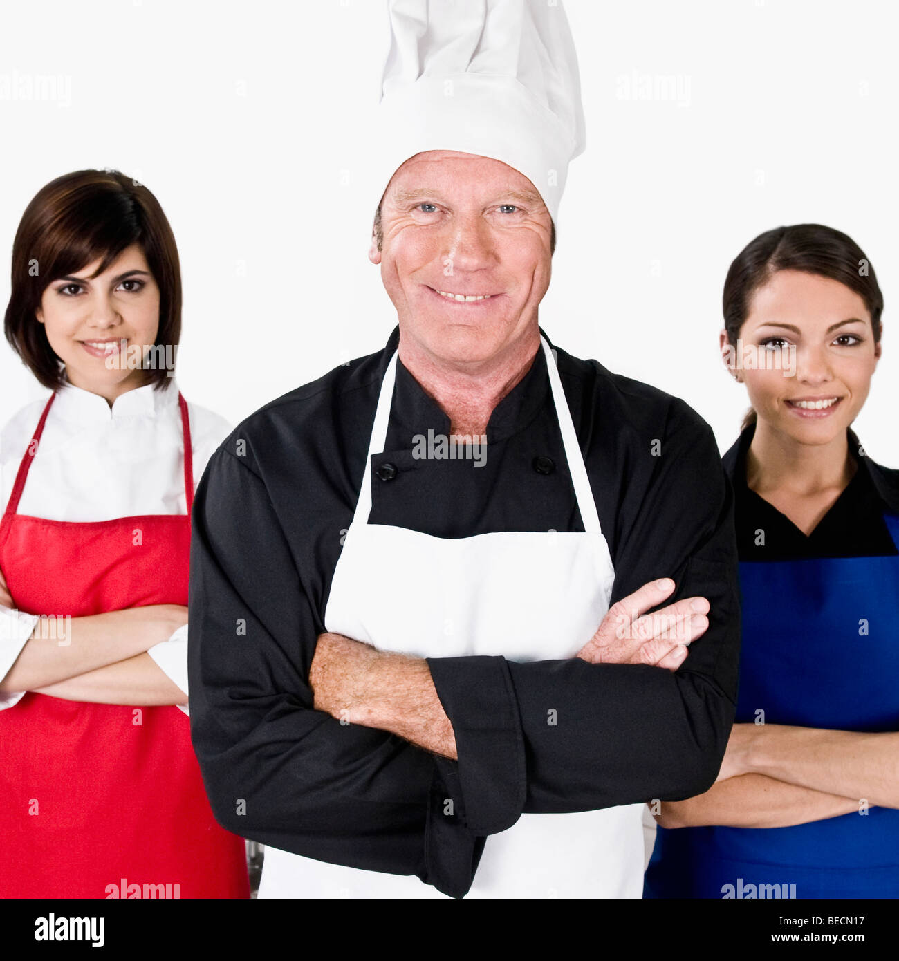 Portrait of three chefs smiling Stock Photo - Alamy