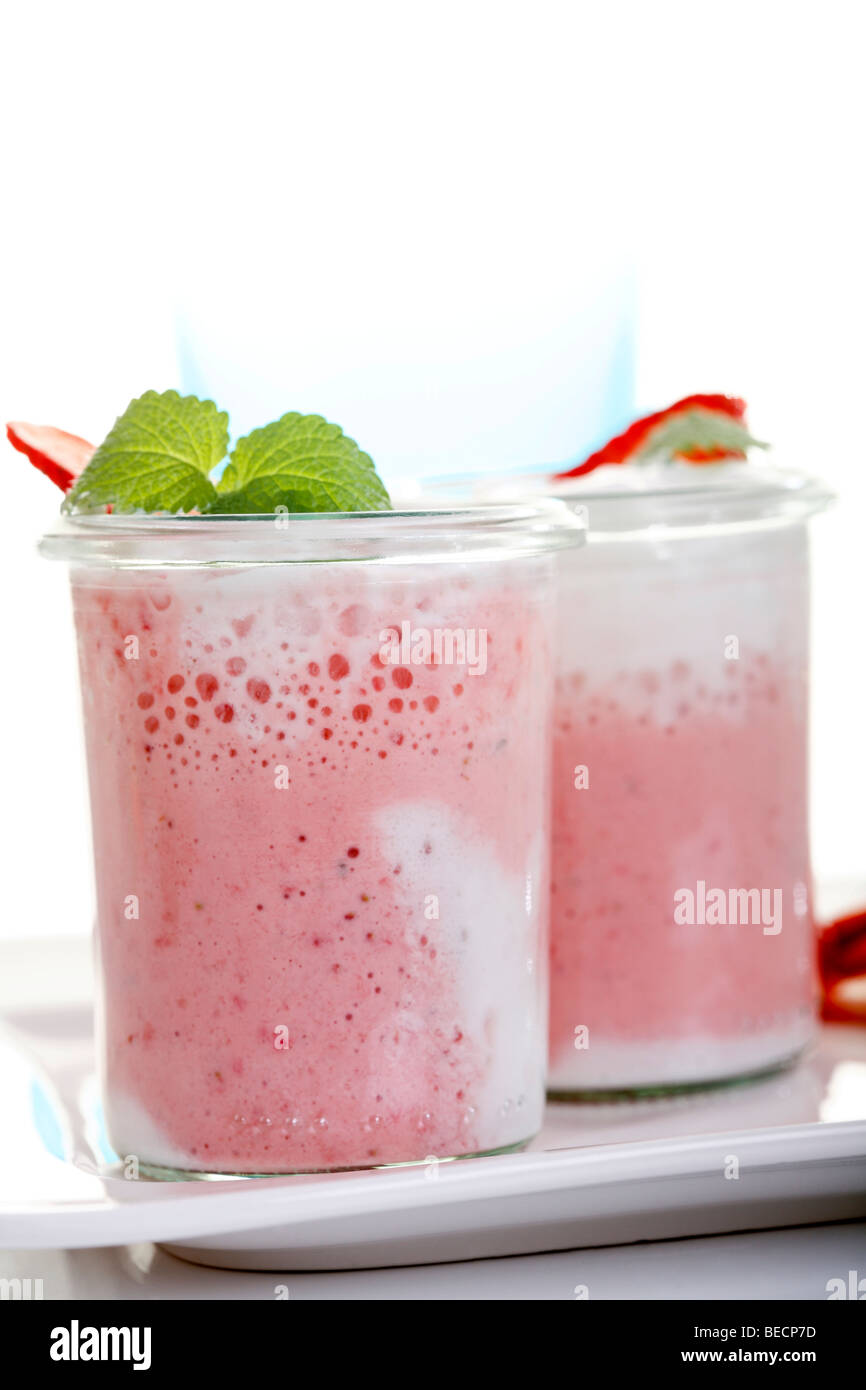 Strawberry quark, yoghurt with fresh strawberries and mint Stock Photo ...