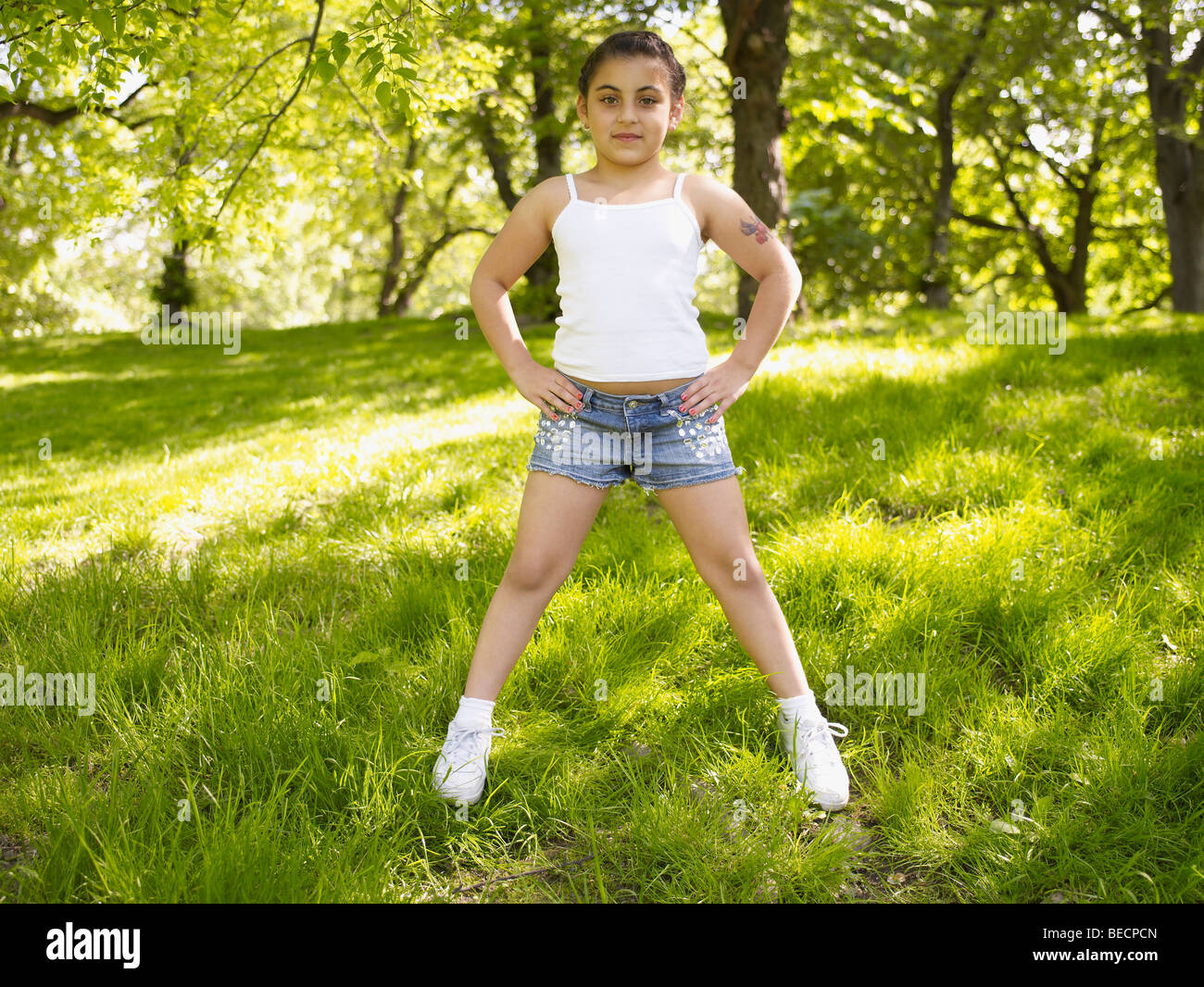 Girl with hands on hips girl with hands on hips hi-res stock ...