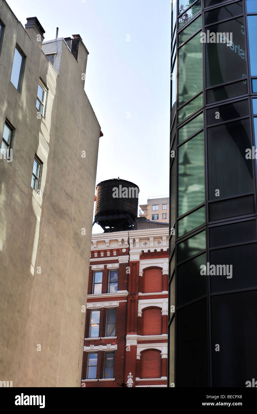 Old and New Downtown architecture details, water tower on top of old ...