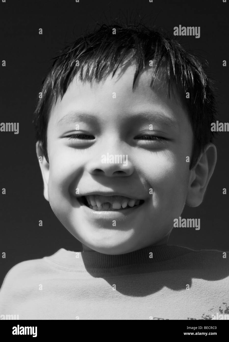 Portrait of a boy smiling Stock Photo - Alamy