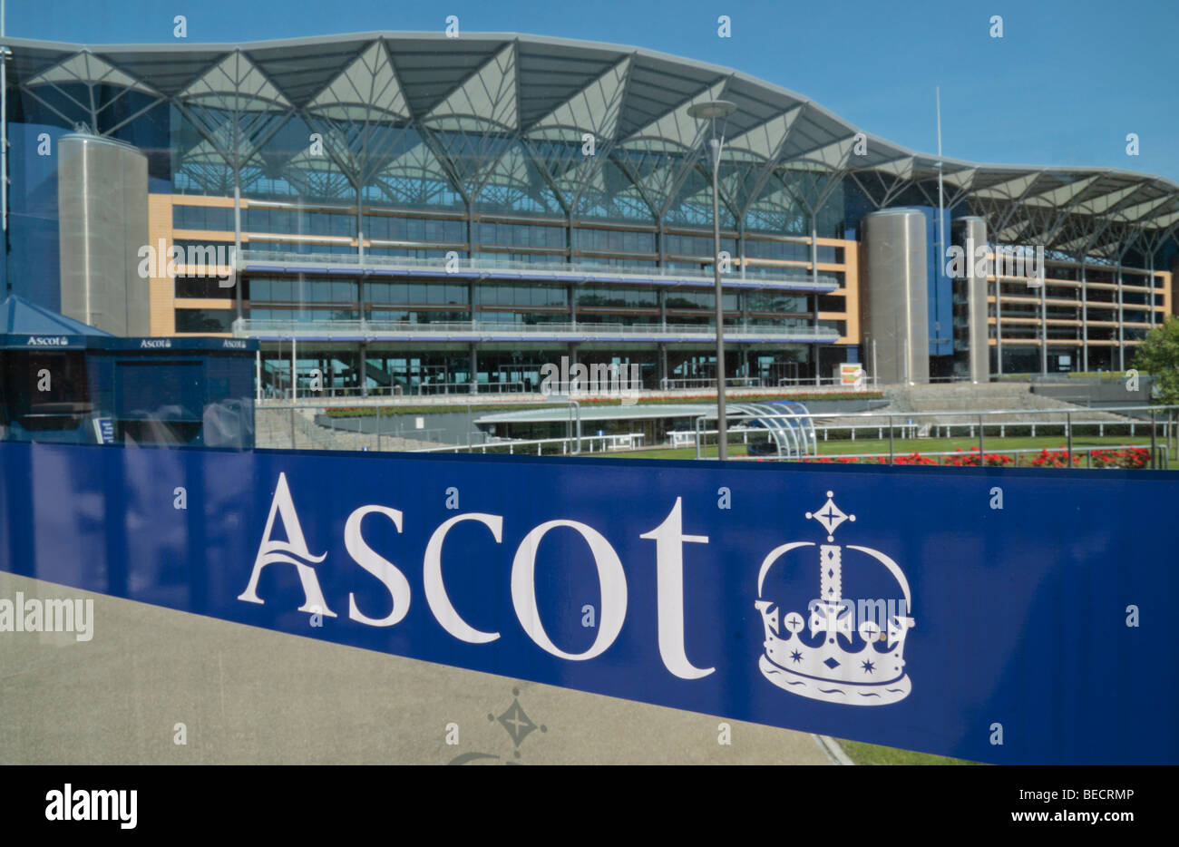 View through a glass panel with the 'Ascot' name and logo towards the ...