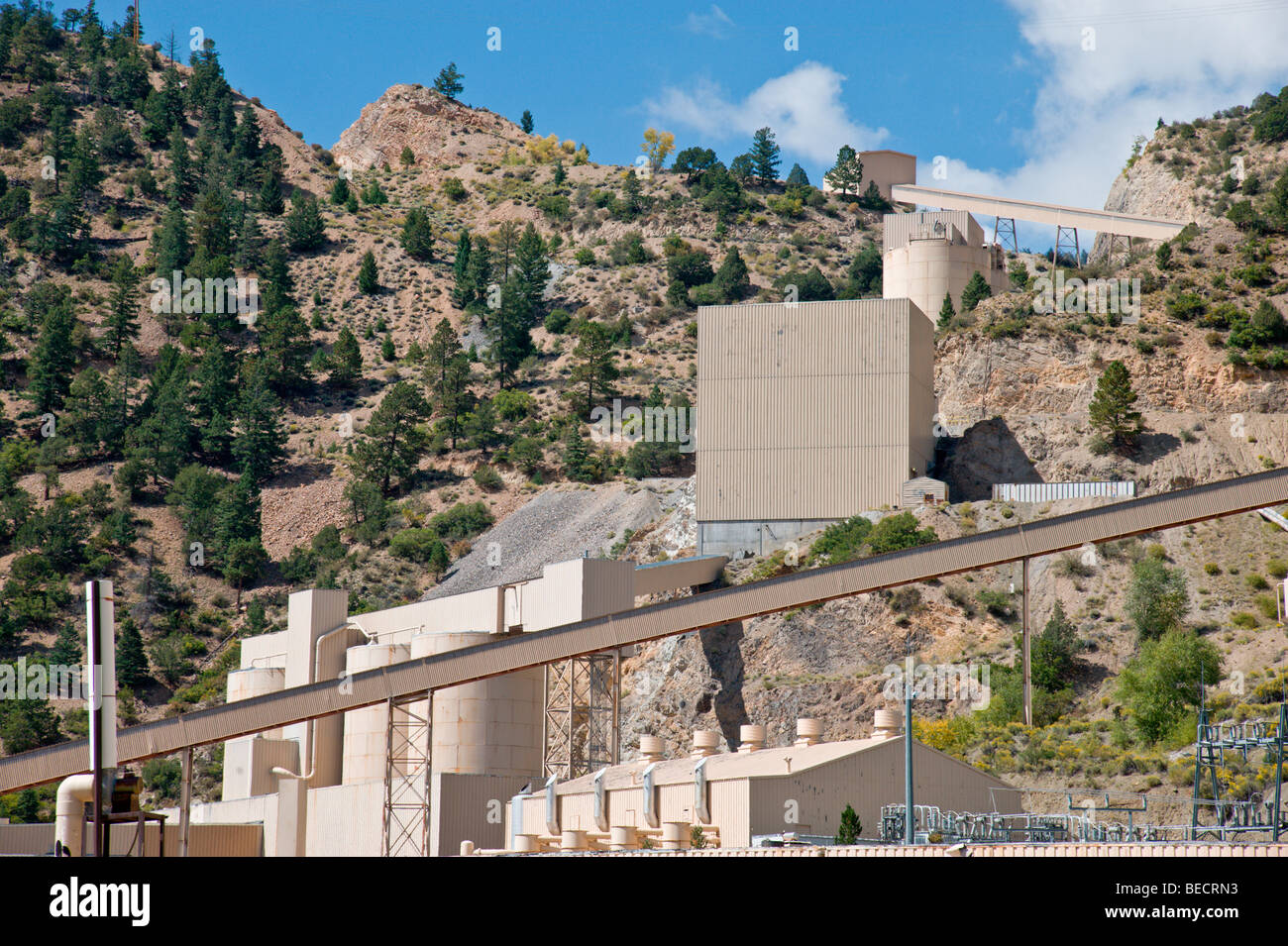 A Chevron mining operation functions on the steep slopes of a mountain ...