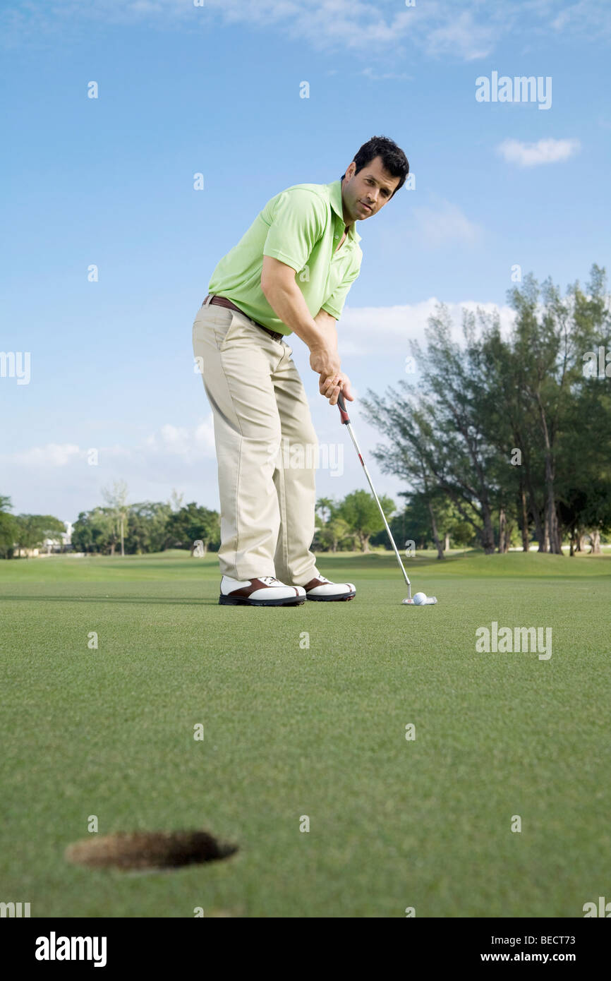 Golfer playing golf in a golf course, Biltmore Golf Course, Coral ...