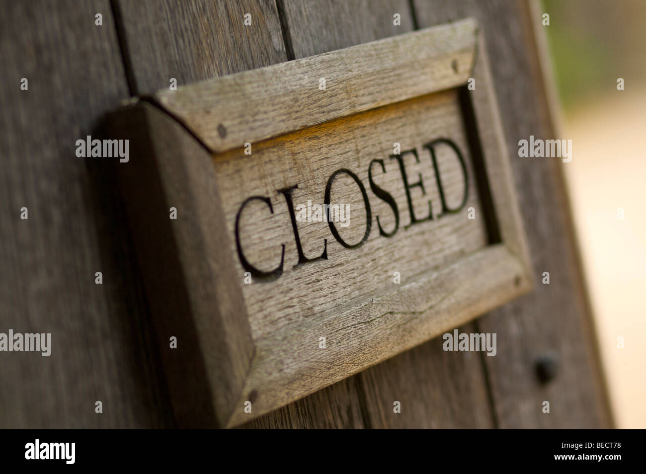 Closed sign on a large wooden medieval door Stock Photo - Alamy