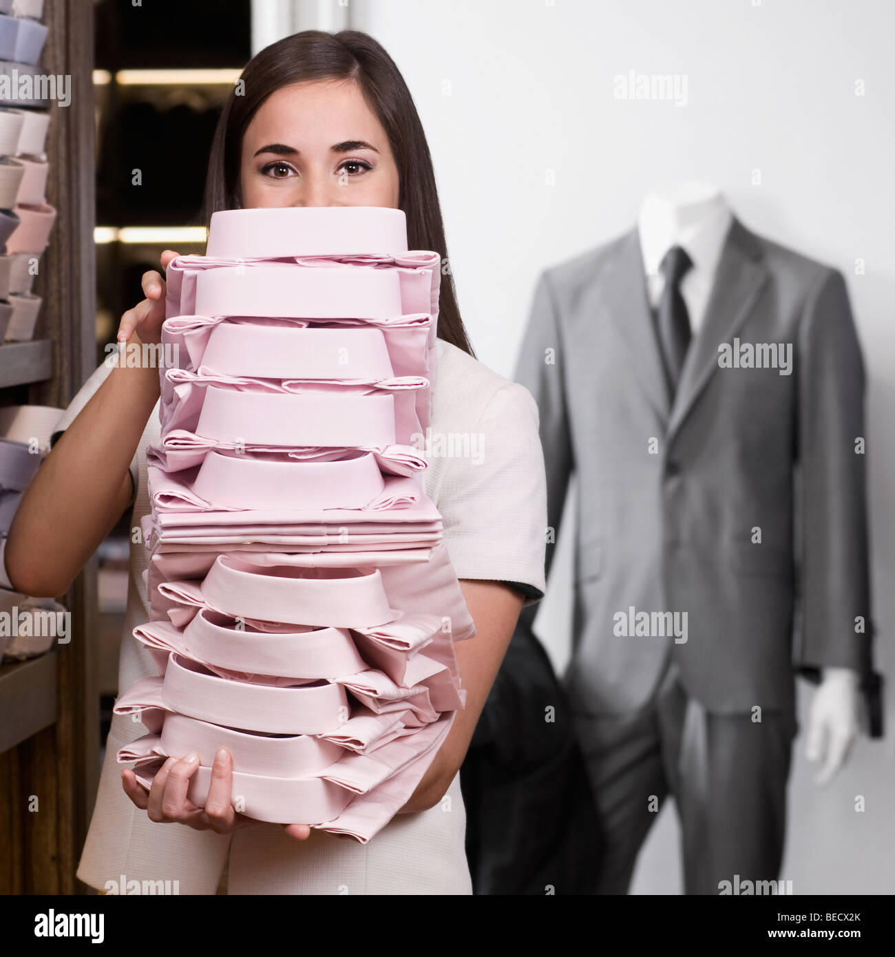 Woman working in a clothing store Stock Photo - Alamy