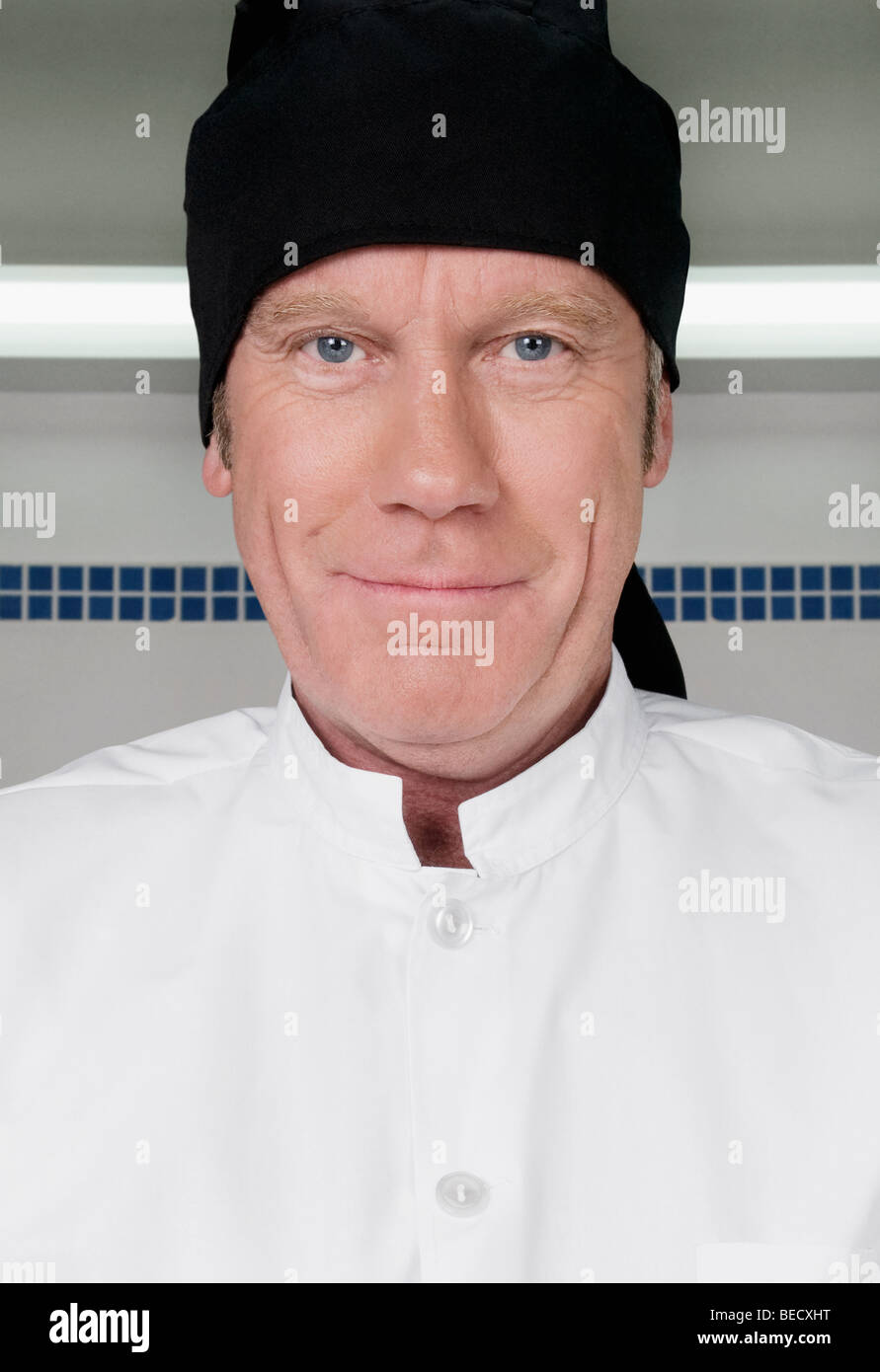 Portrait of a chef smiling Stock Photo - Alamy
