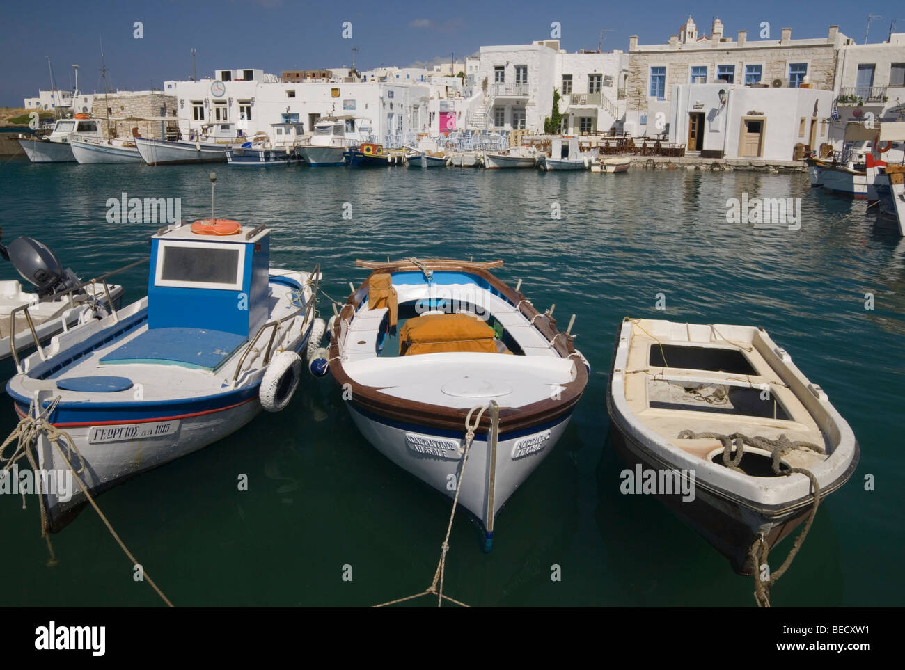 Little boats moored in the small harbour of Naoussa town, Paros, Greece ...