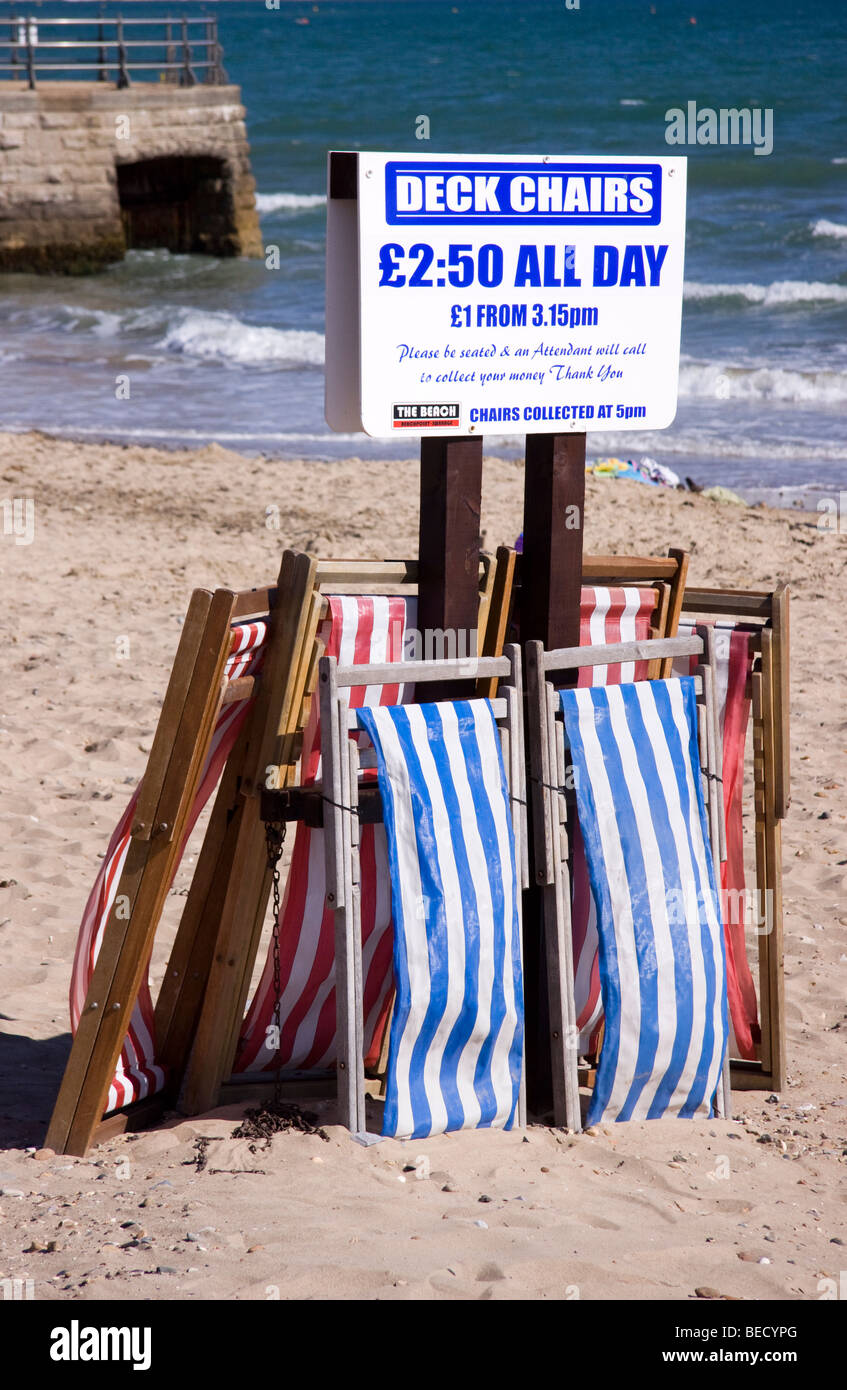 A Deck Chair stand on the beach at Swanage, Dorset Stock Photo - Alamy