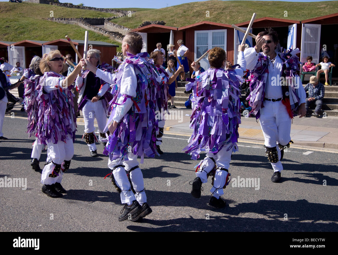 Traditional dancers performing stick dance hi-res stock photography and ...