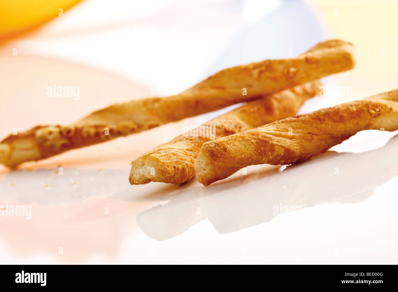 Cheese flavoured snack sticks Stock Photo - Alamy