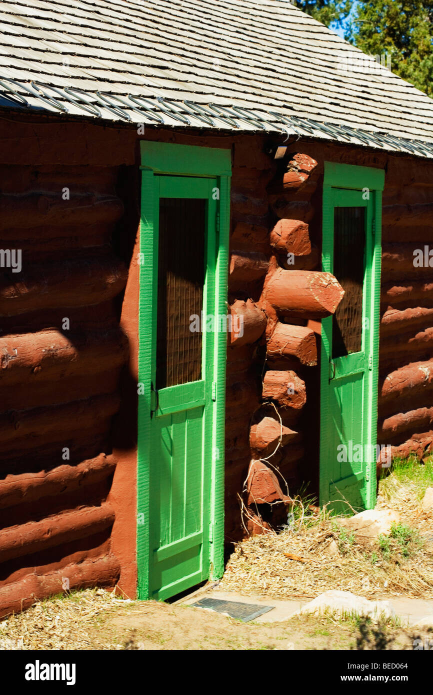 Closed doors of a log cabin Stock Photo - Alamy