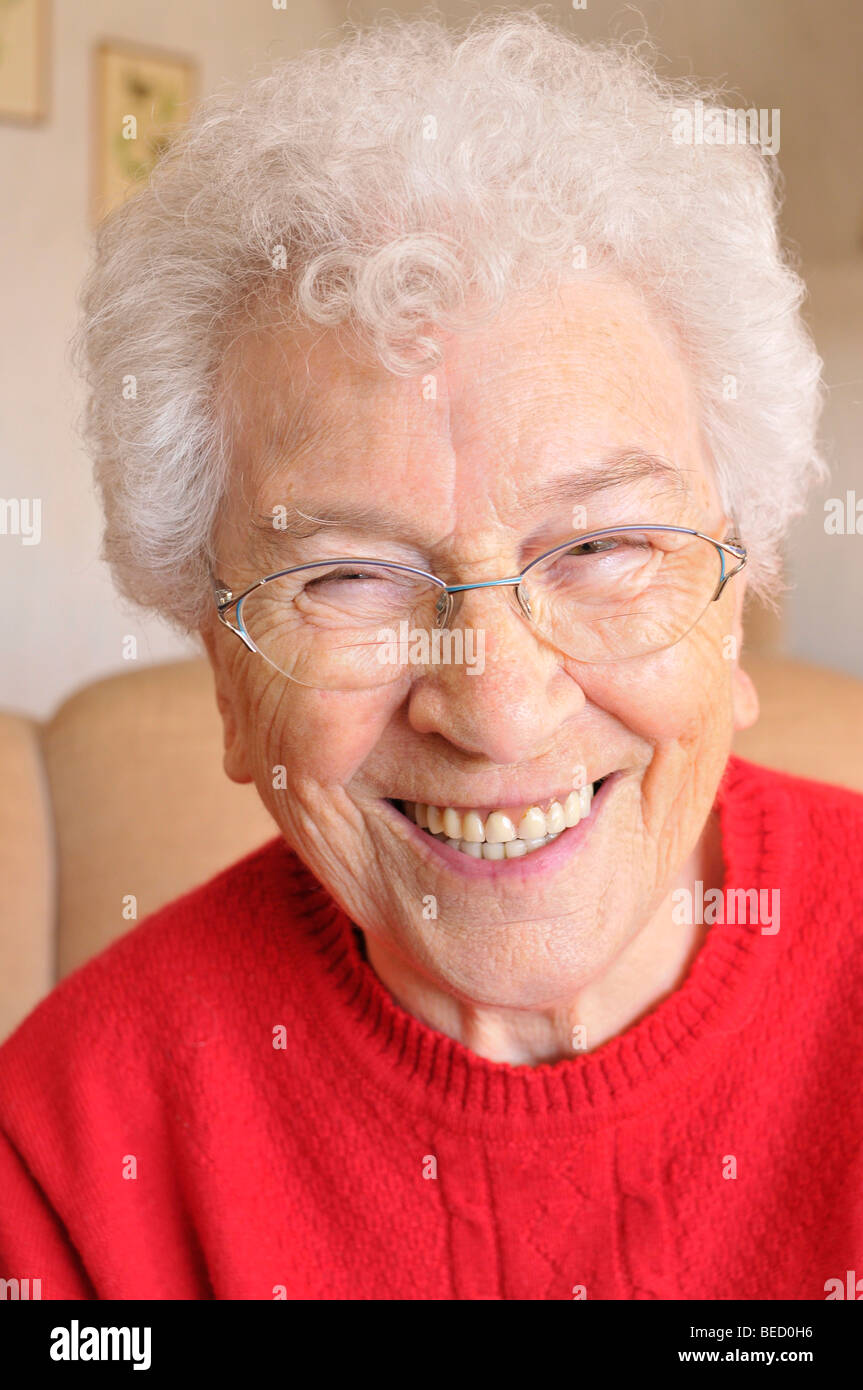 Smiling female senior citizen Stock Photo - Alamy