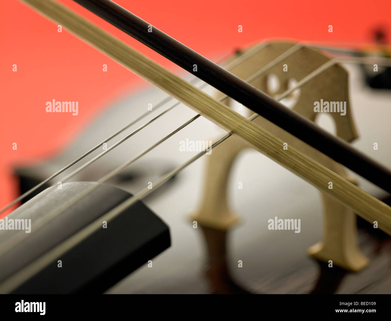 cello bridge and bow Stock Photo - Alamy