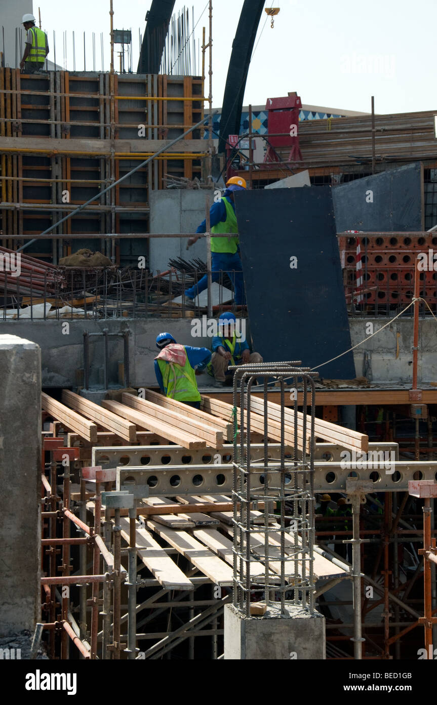 Construction work on a building site in Dubai Stock Photo - Alamy