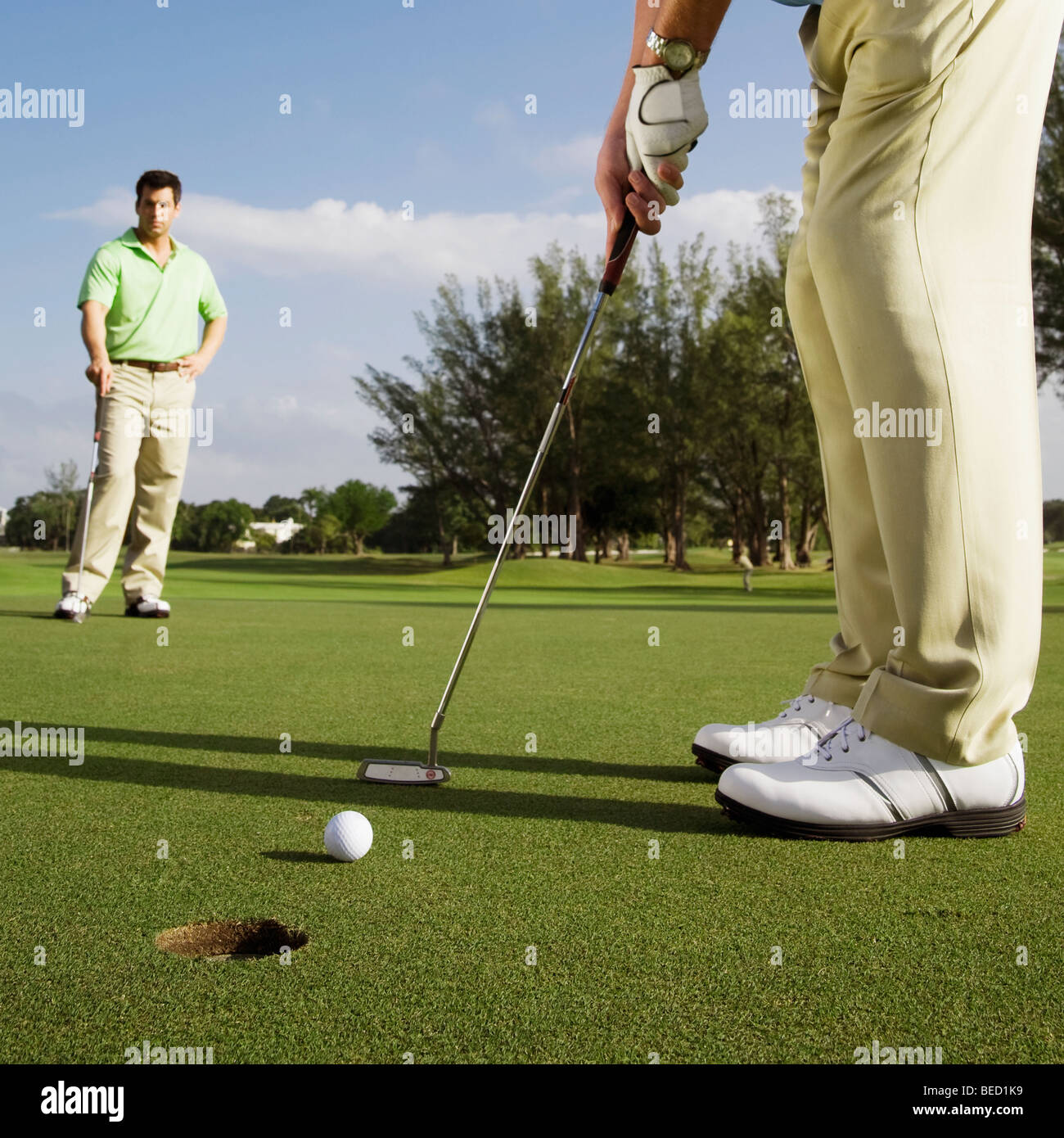 Two golfer playing golf in a golf course, Biltmore Golf Course, Coral ...