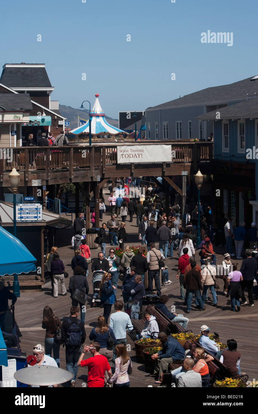 Group of people in a street market, Pier 39, San Francisco, California ...