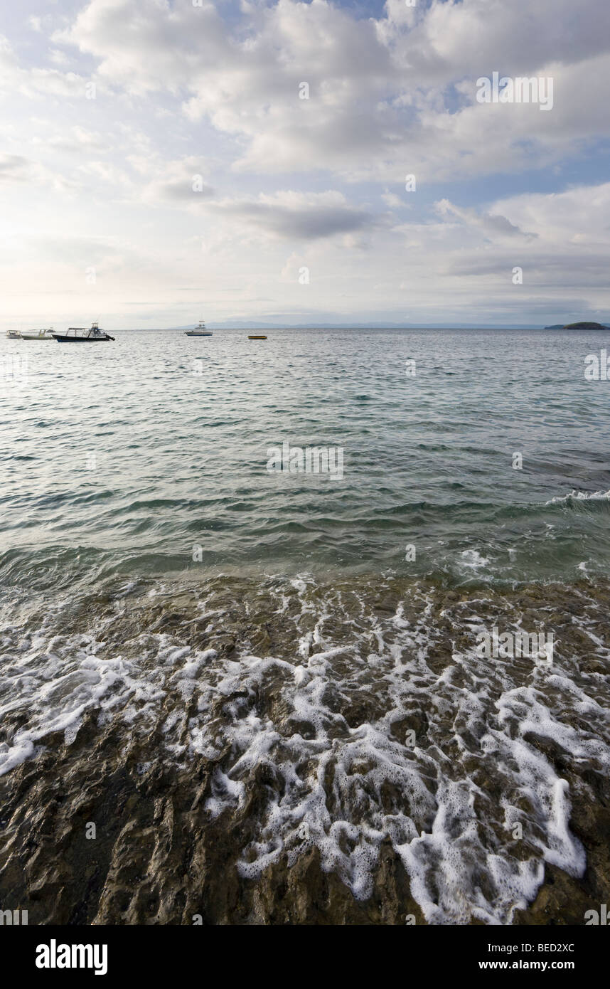 Sea meets the volcanic coast of Playa Ocotal, Guanacaste Province ...
