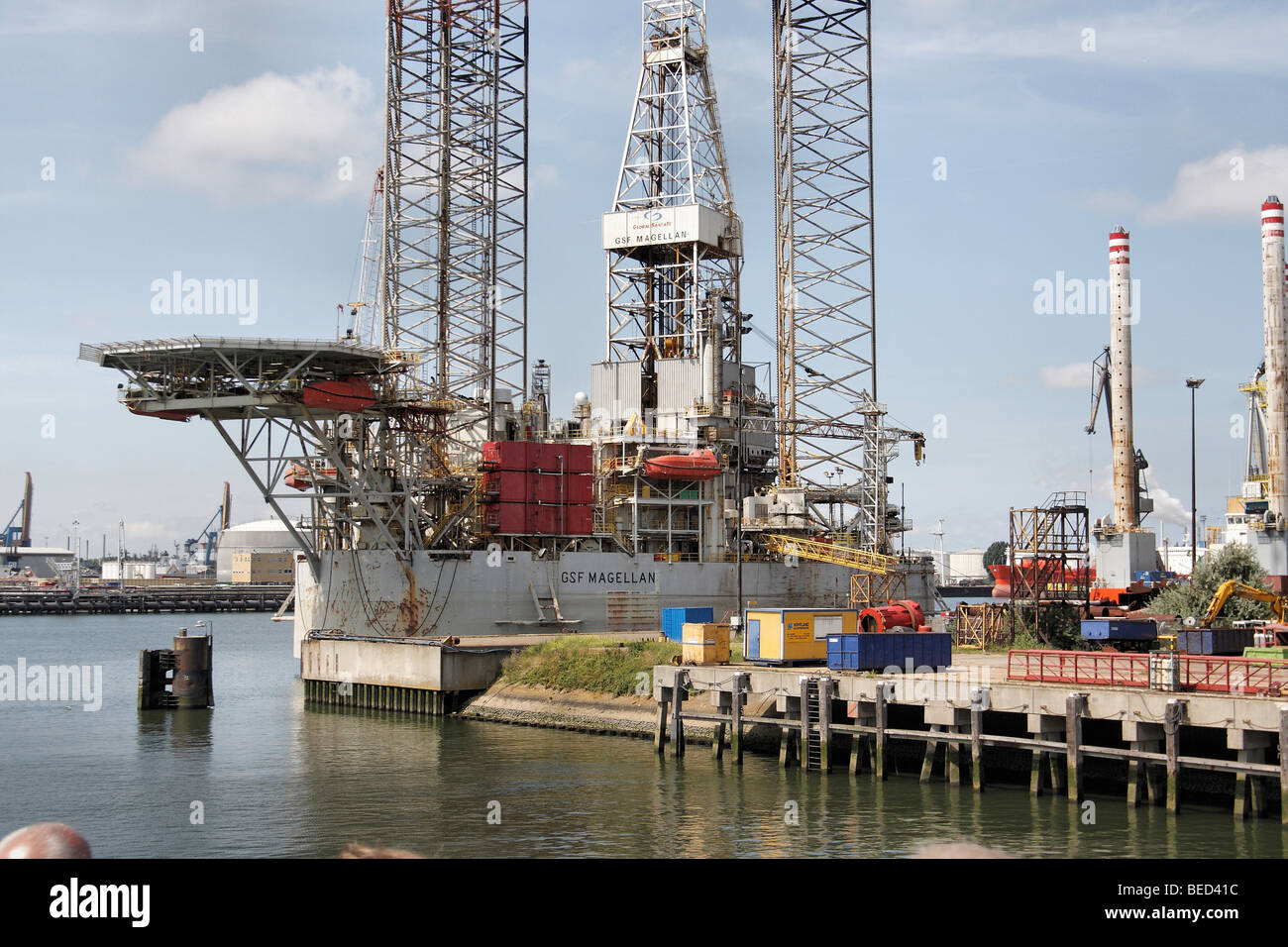 An ocean drilling rig gets re-fitted in Rotterdam harbor Stock Photo ...