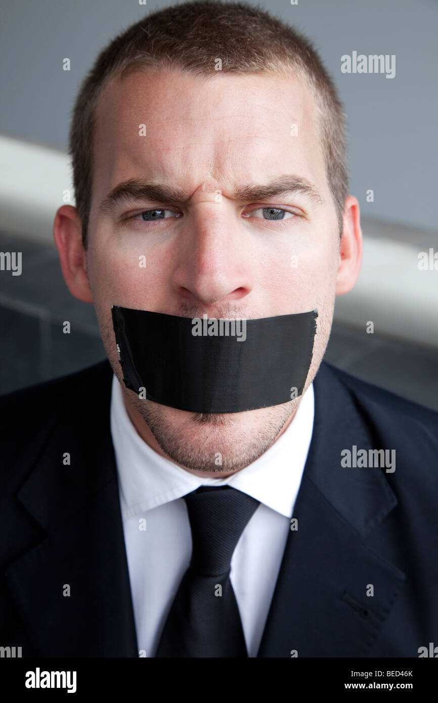 Business man silenced and angry Stock Photo - Alamy