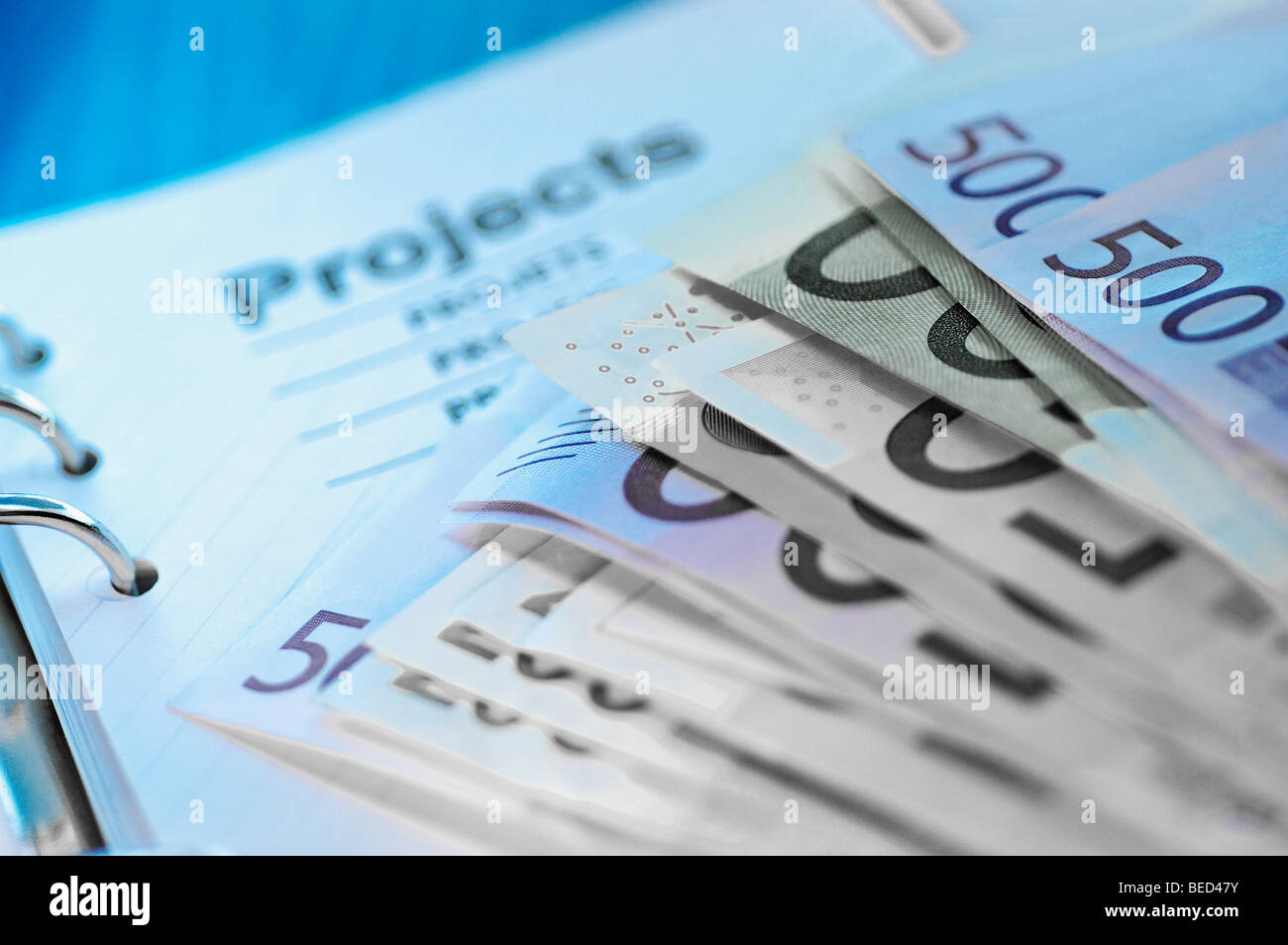 Close-up of European union banknotes on a spiral notebook Stock Photo ...