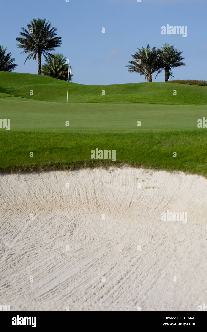 Sand trap in a golf course Stock Photo - Alamy