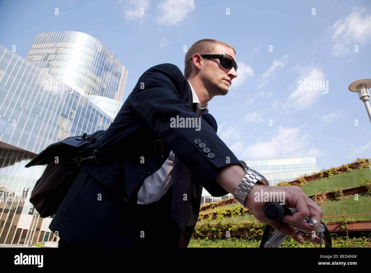 Man on modern small bicycle hi-res stock photography and images - Alamy