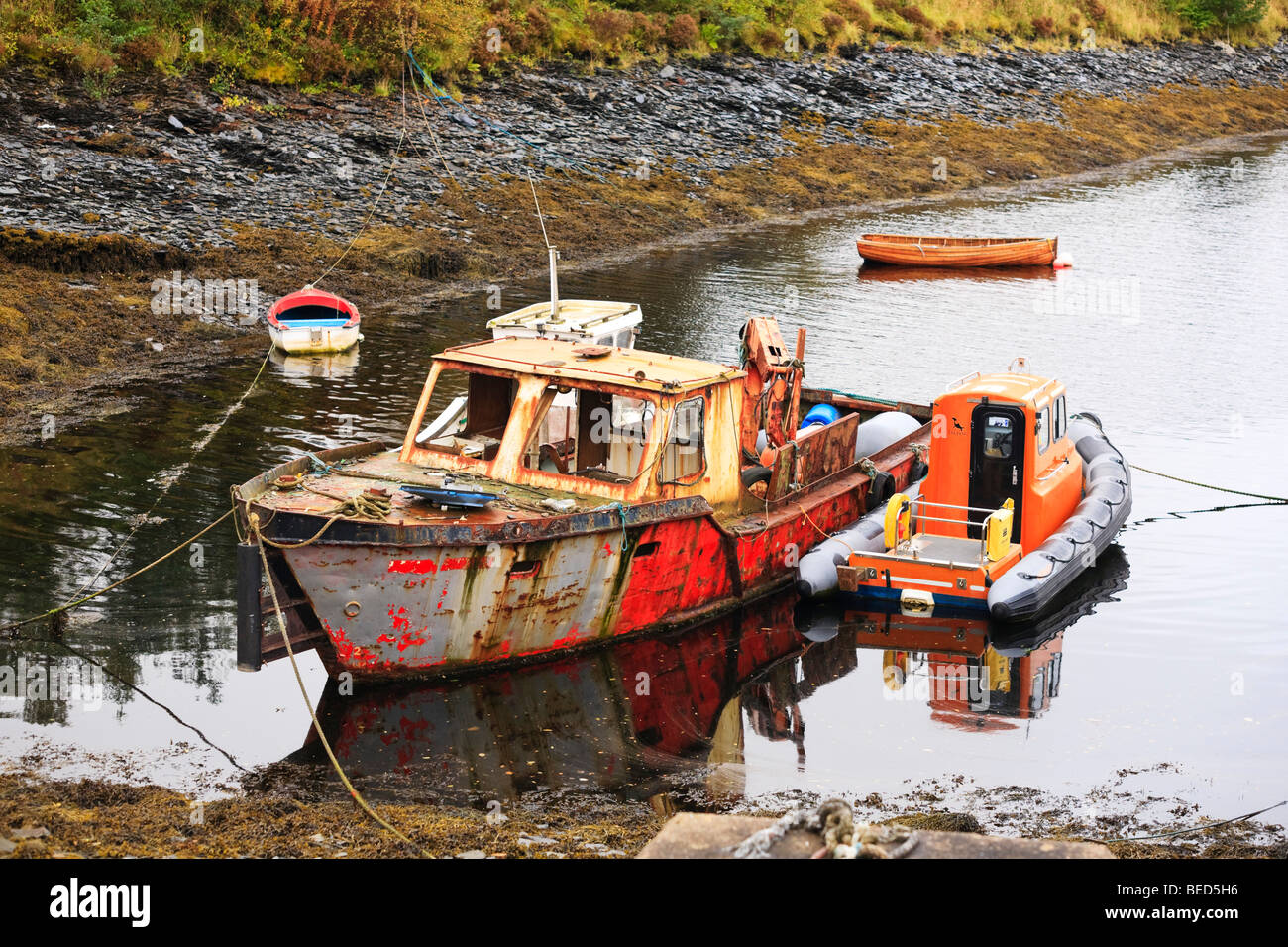 Rusty old fishing boat in Ballachulish harbour, Argyll Scotland Stock ...