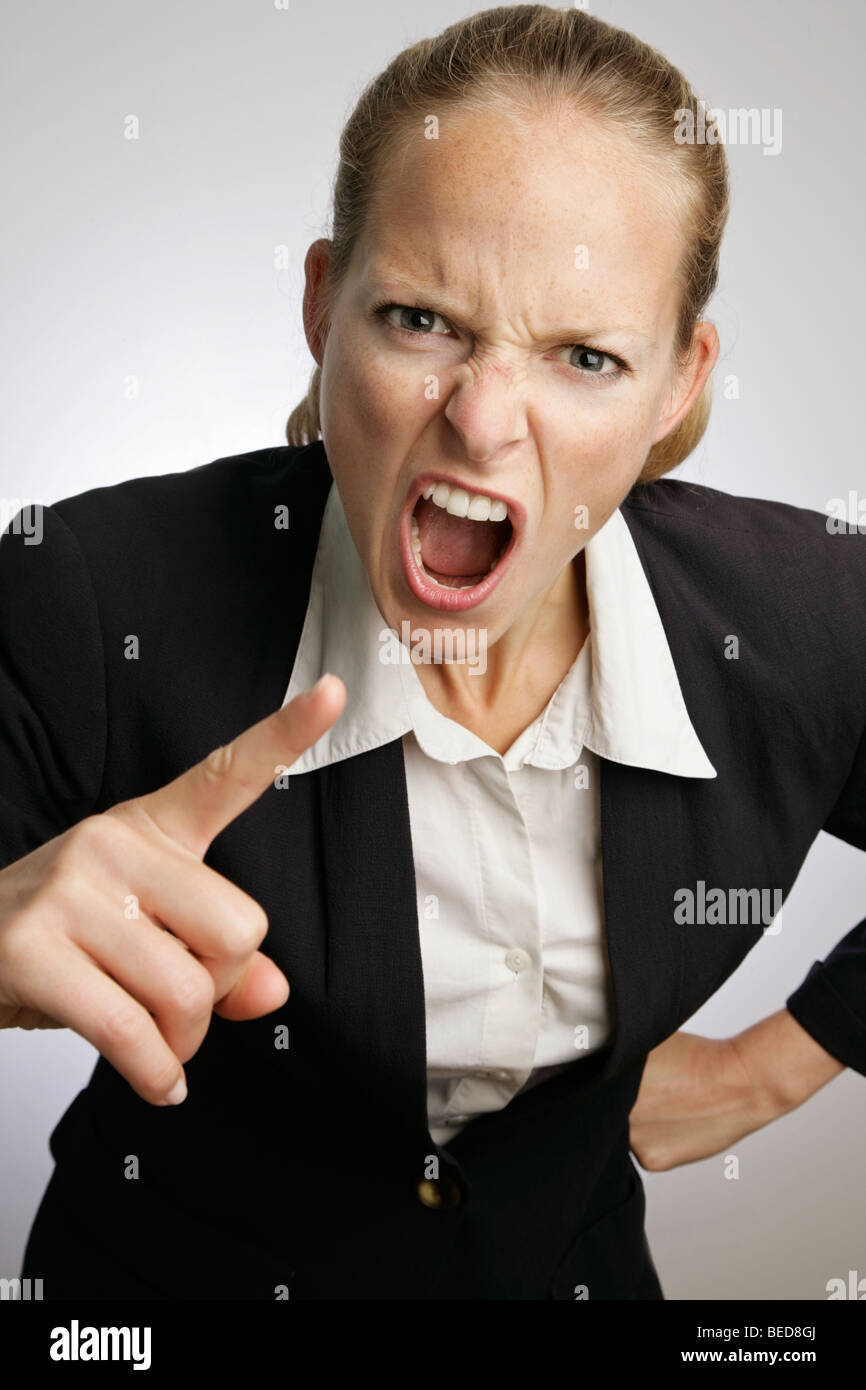 Angry business woman Stock Photo - Alamy