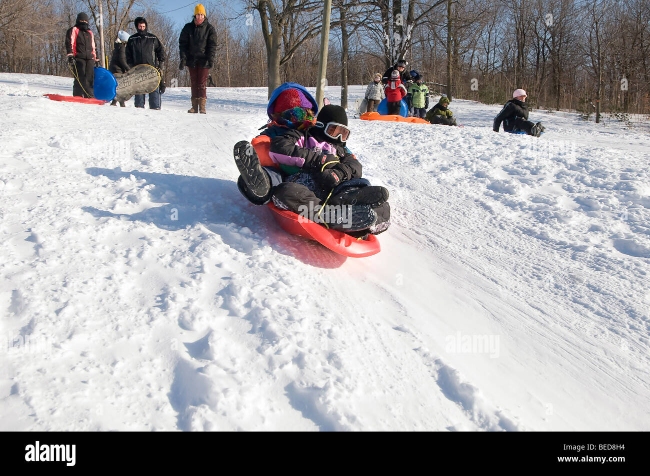 Sliding in the snow hi-res stock photography and images - Alamy