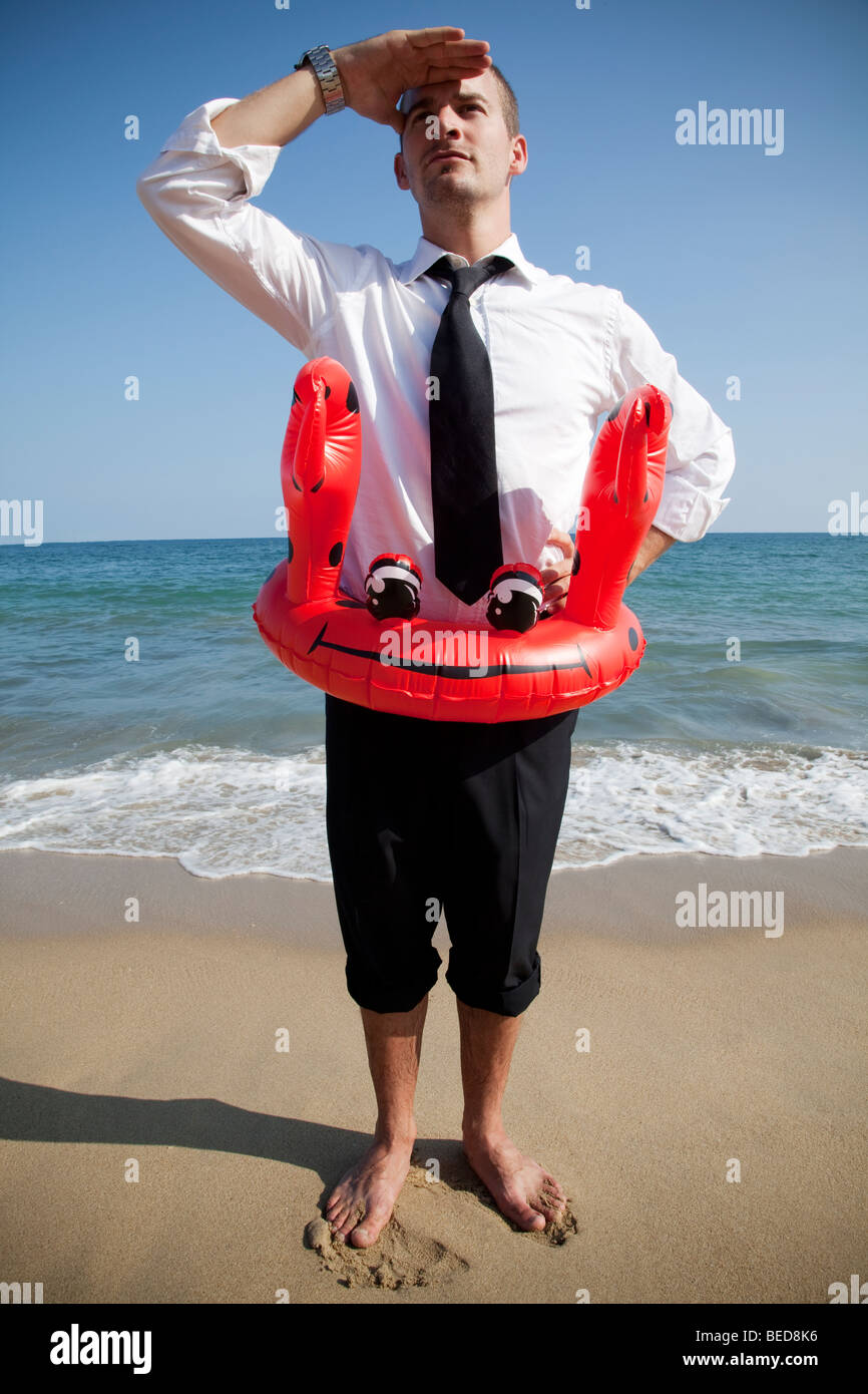 Business man looking towards a sure future Stock Photo - Alamy