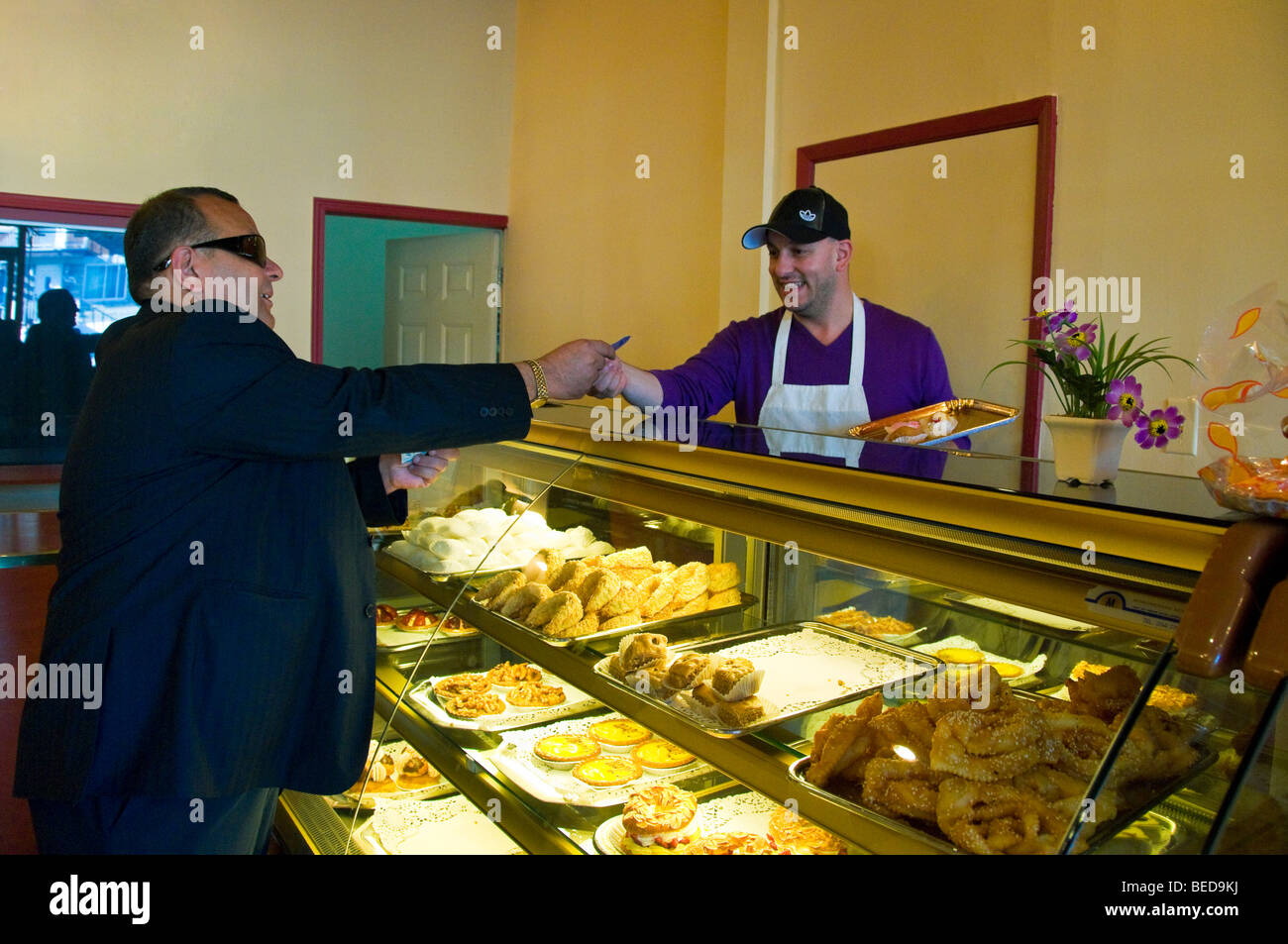 Client buying Arabic pastries in the Petit Maghreb sector Montreal ...