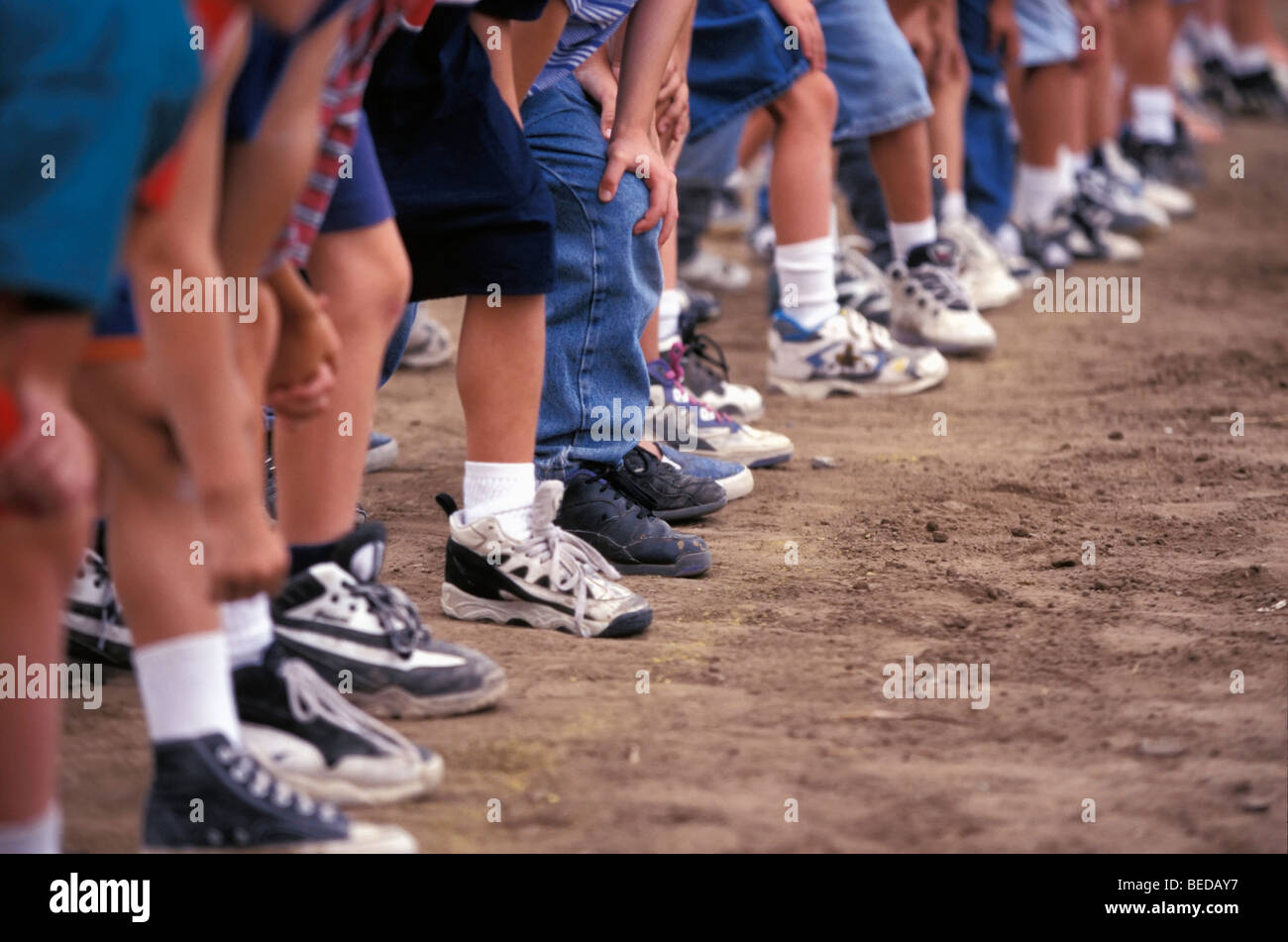 Boys line up for a footrace at a county fair Stock Photo - Alamy
